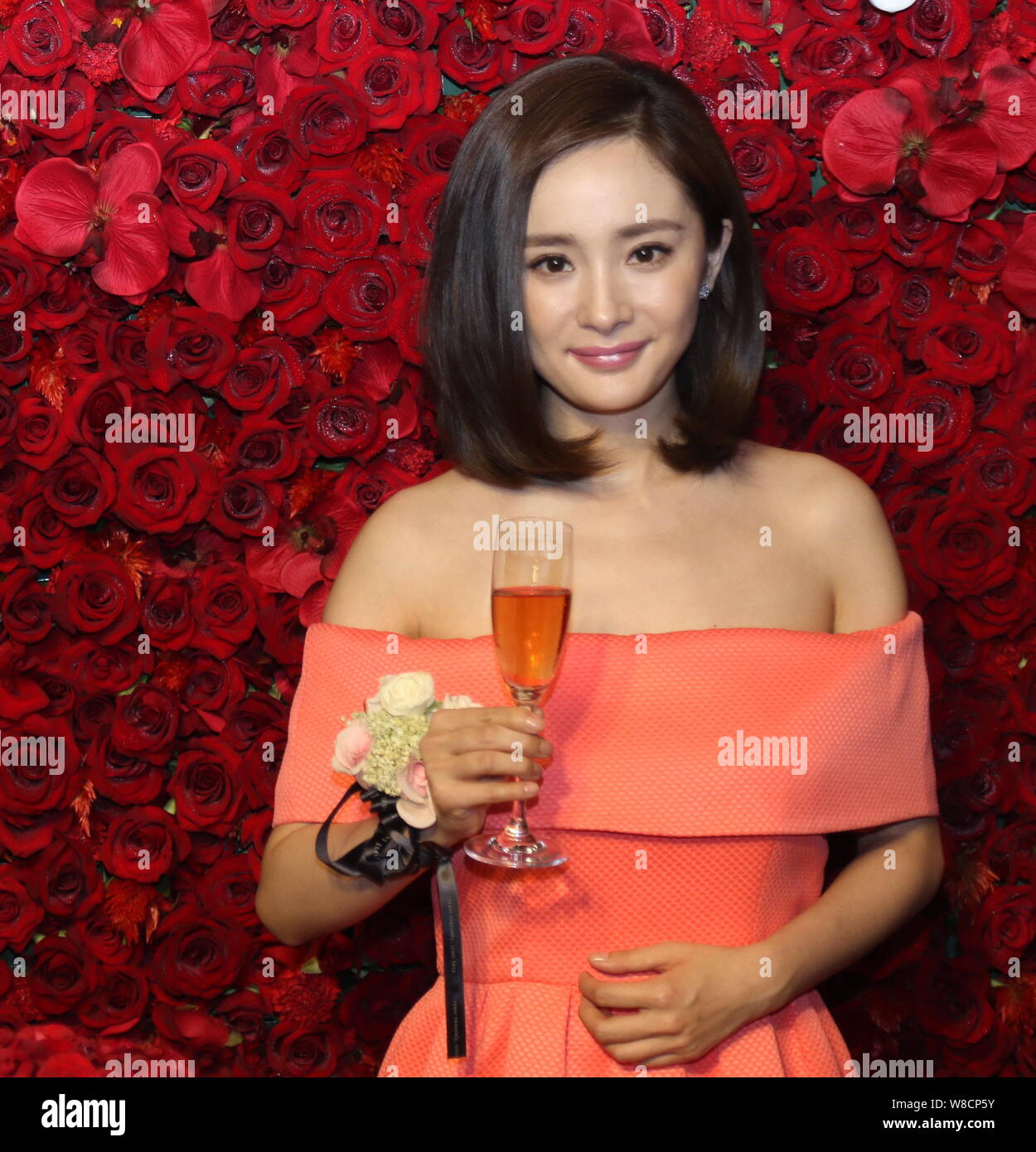 Chinese actress Yang Mi poses during the opening ceremony for a new ...