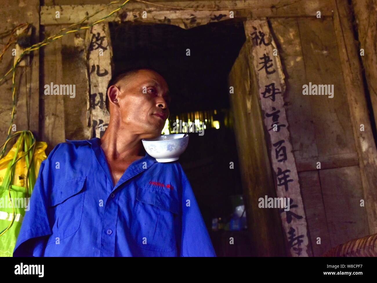 Chen Xingyin, a 48-year-old farmer who lost his arms at seven, left ...