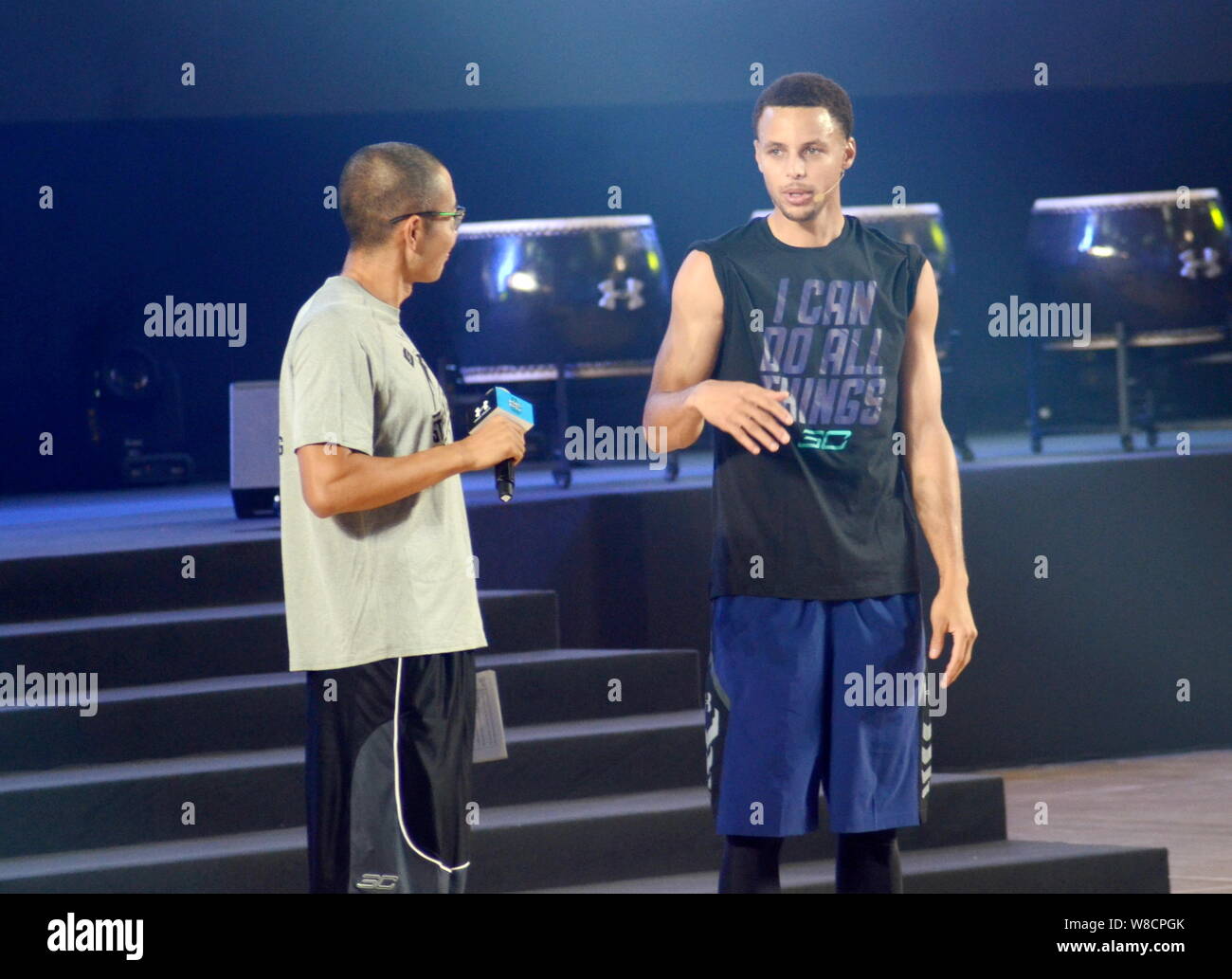 NBA star Stephen Curry, right, speaks during a fan meeting event in ...