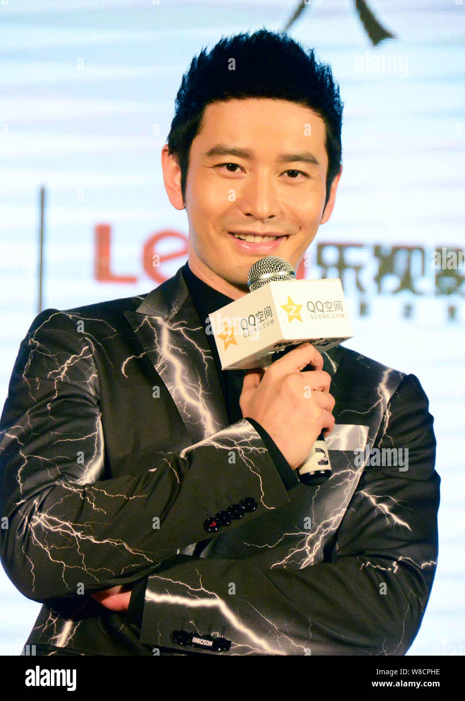 Chinese actor Huang Xiaoming smiles during a press conference for his ...