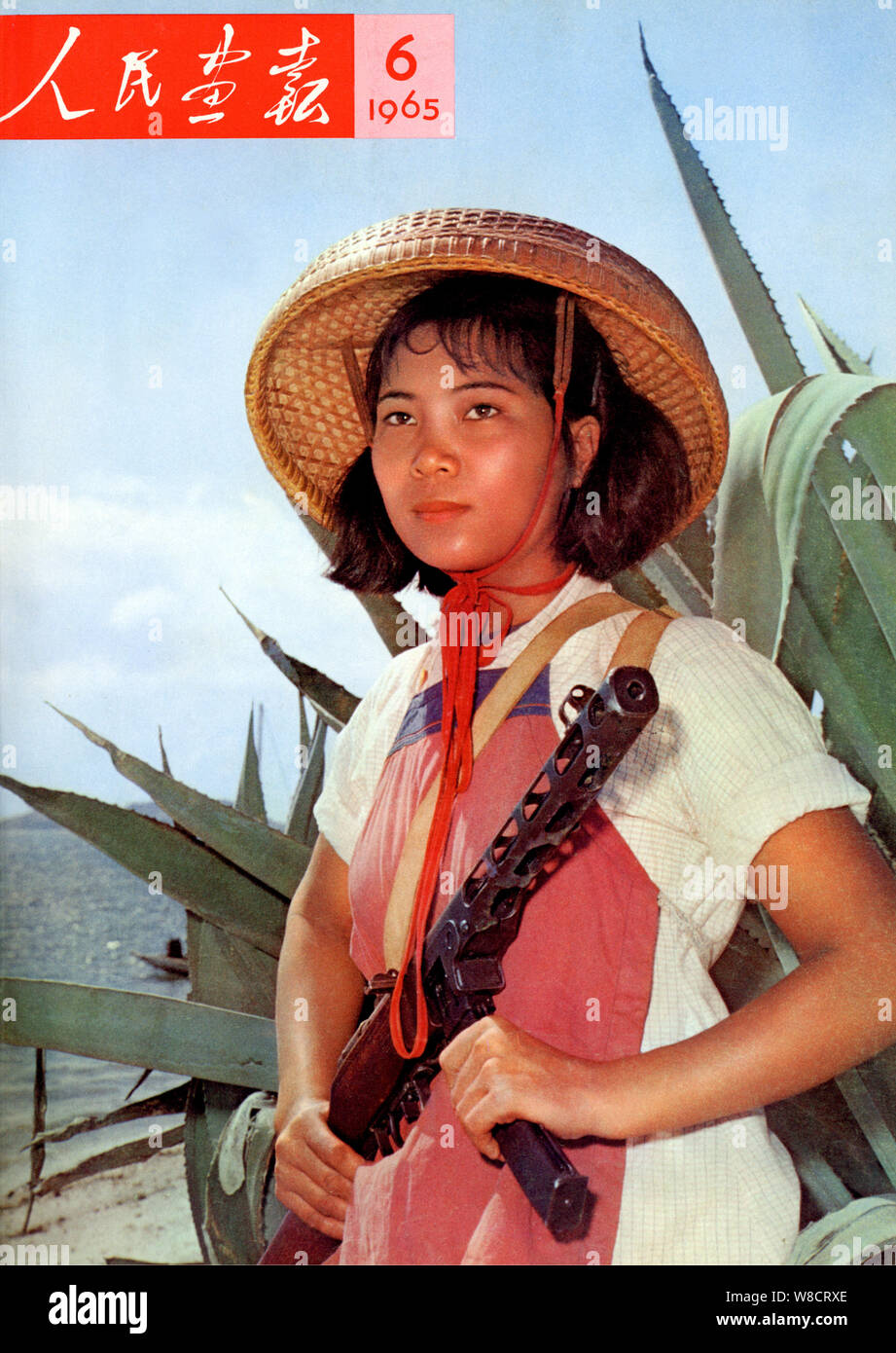 This cover of the China Pictorial 6th issue in 1965 features an armed ...