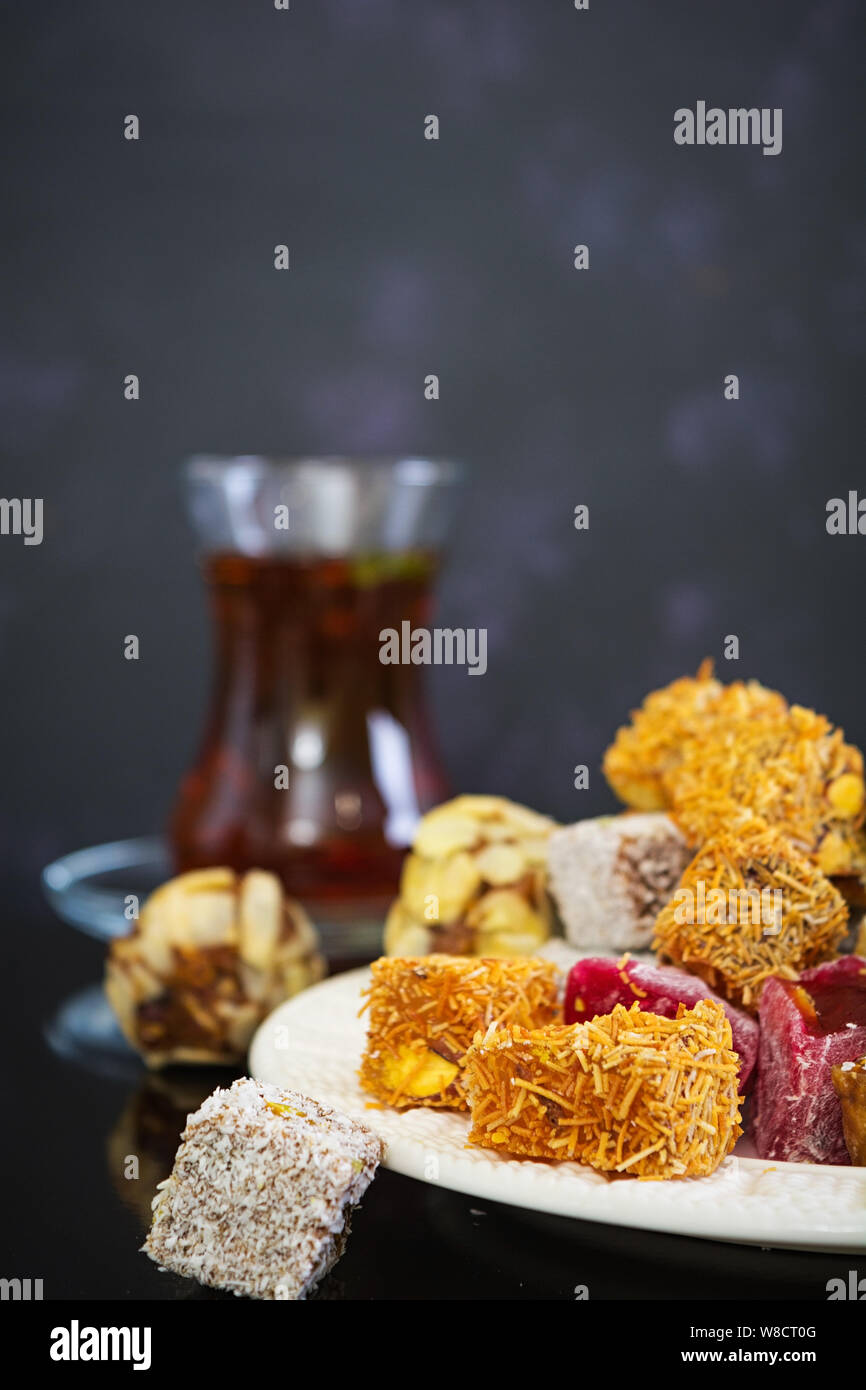 Turkish delights lokum on dark background Stock Photo - Alamy