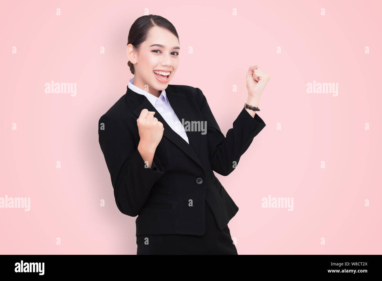 Young Business Woman celebrating a successful work day Stock Photo - Alamy