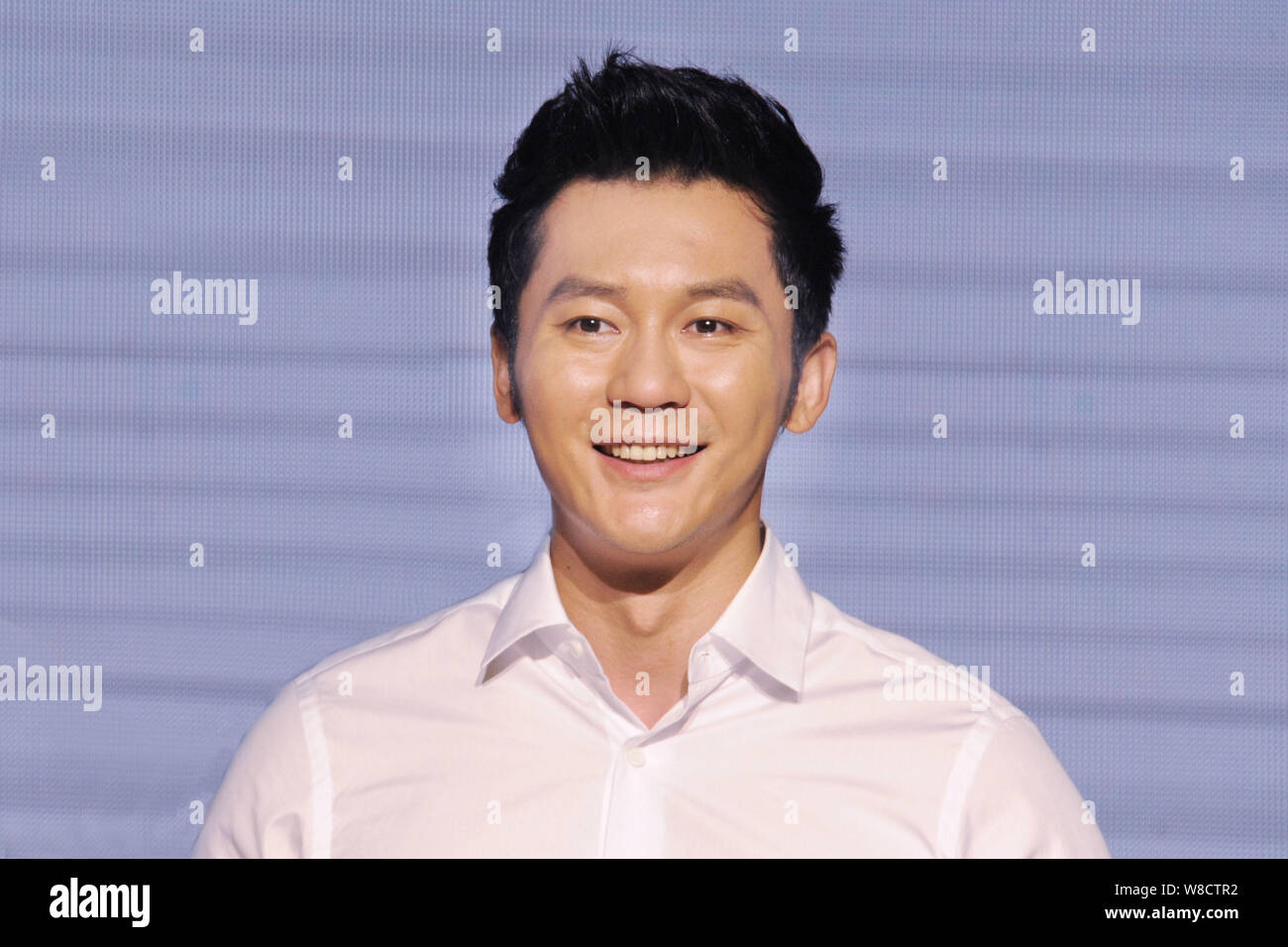 Chinese actor Li Chen smiles during a press conference for China's ...