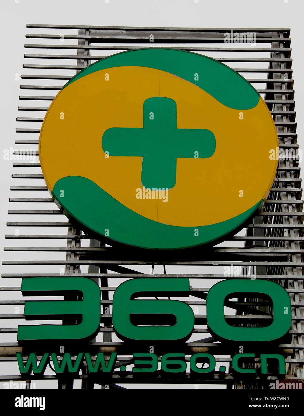 --FILE--A signboard of Qihoo (360.cn) is seen at its headquarters in ...