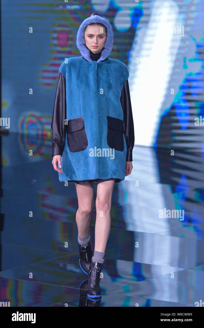 A Model Displays A New Creation By Chinese Fashion Designer Fan Ran At The Ranfan Fashion Show