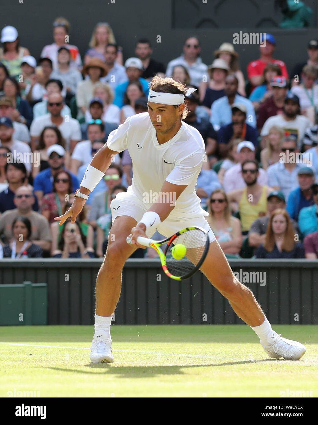 Spanish tennis player Rafael Nadal playing forehand volley during 2019 ...