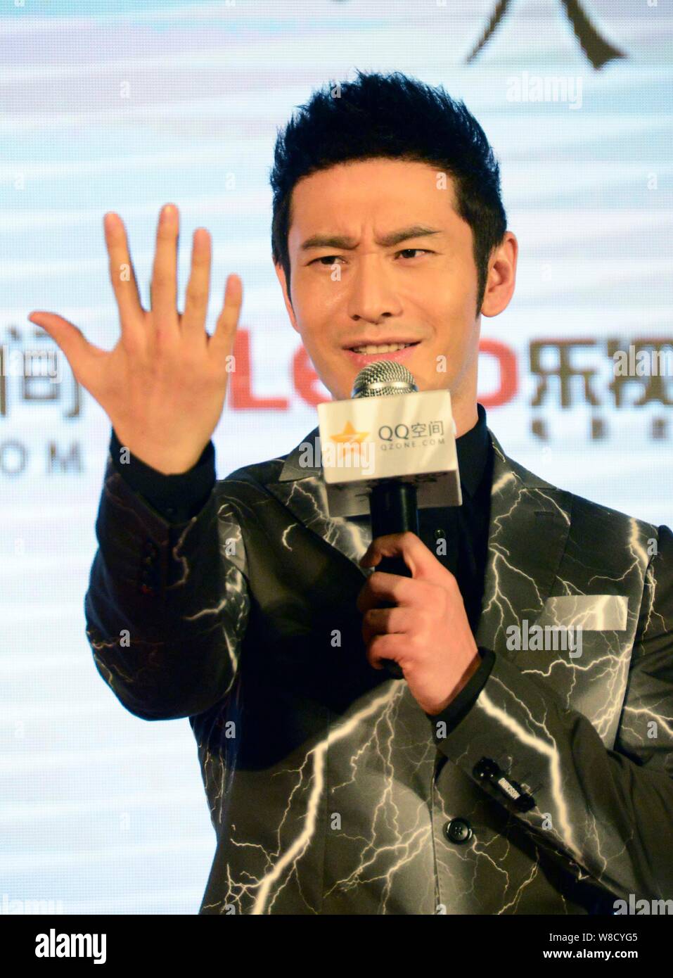 Chinese actor Huang Xiaoming poses during a press conference for his ...