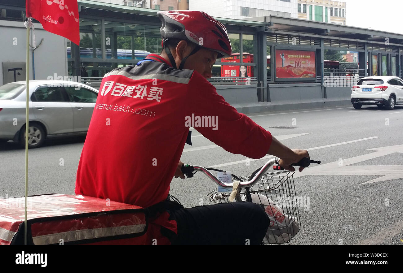 A Chinese deliveryman of Baidu's food delivery service Baidu Waimai ...