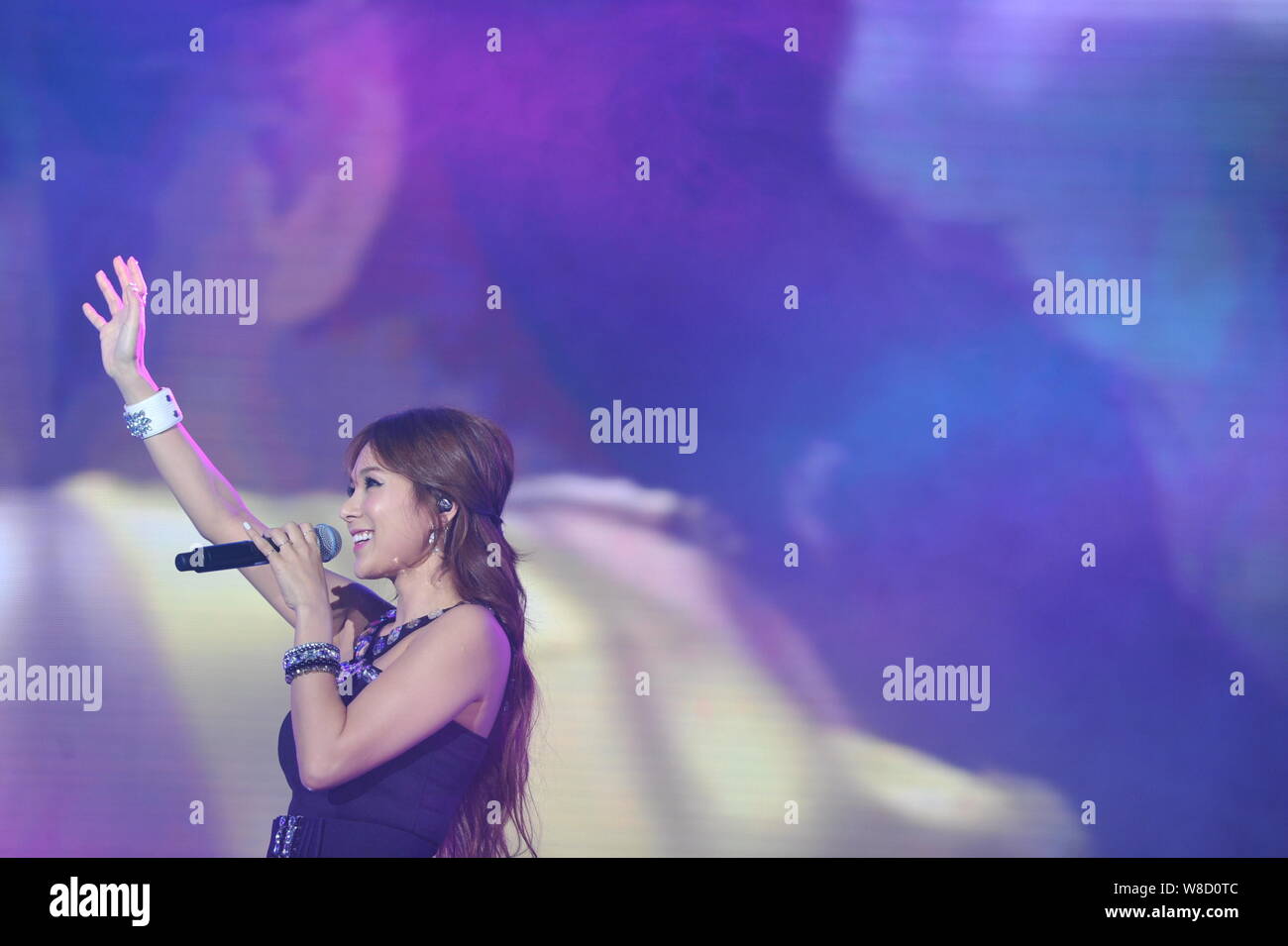 South Korean singer Chae Yeon, center, performs at a Korean stars ...