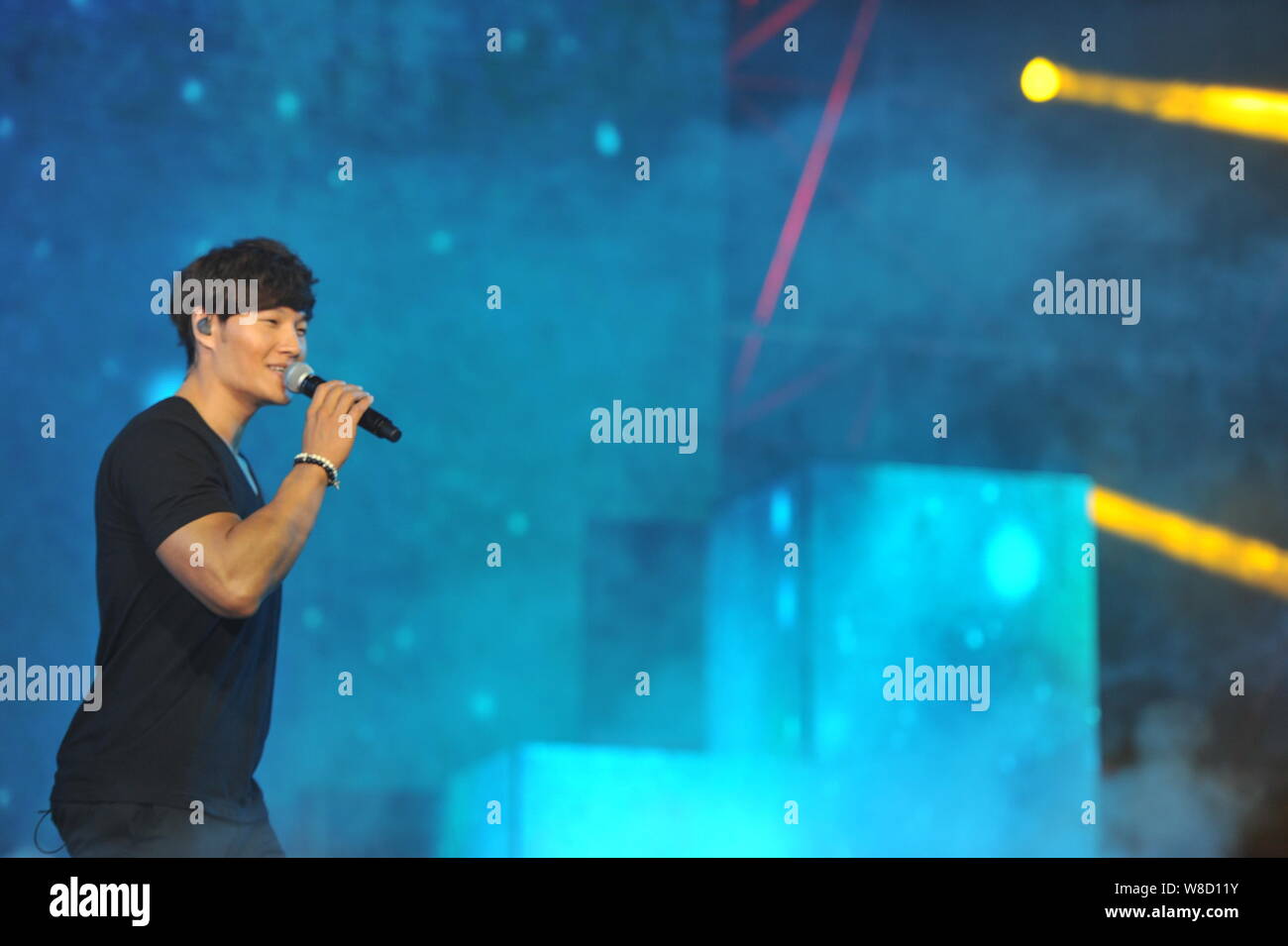 South Korean singer Kim Jong-kook performs at a Korean stars concert in ...