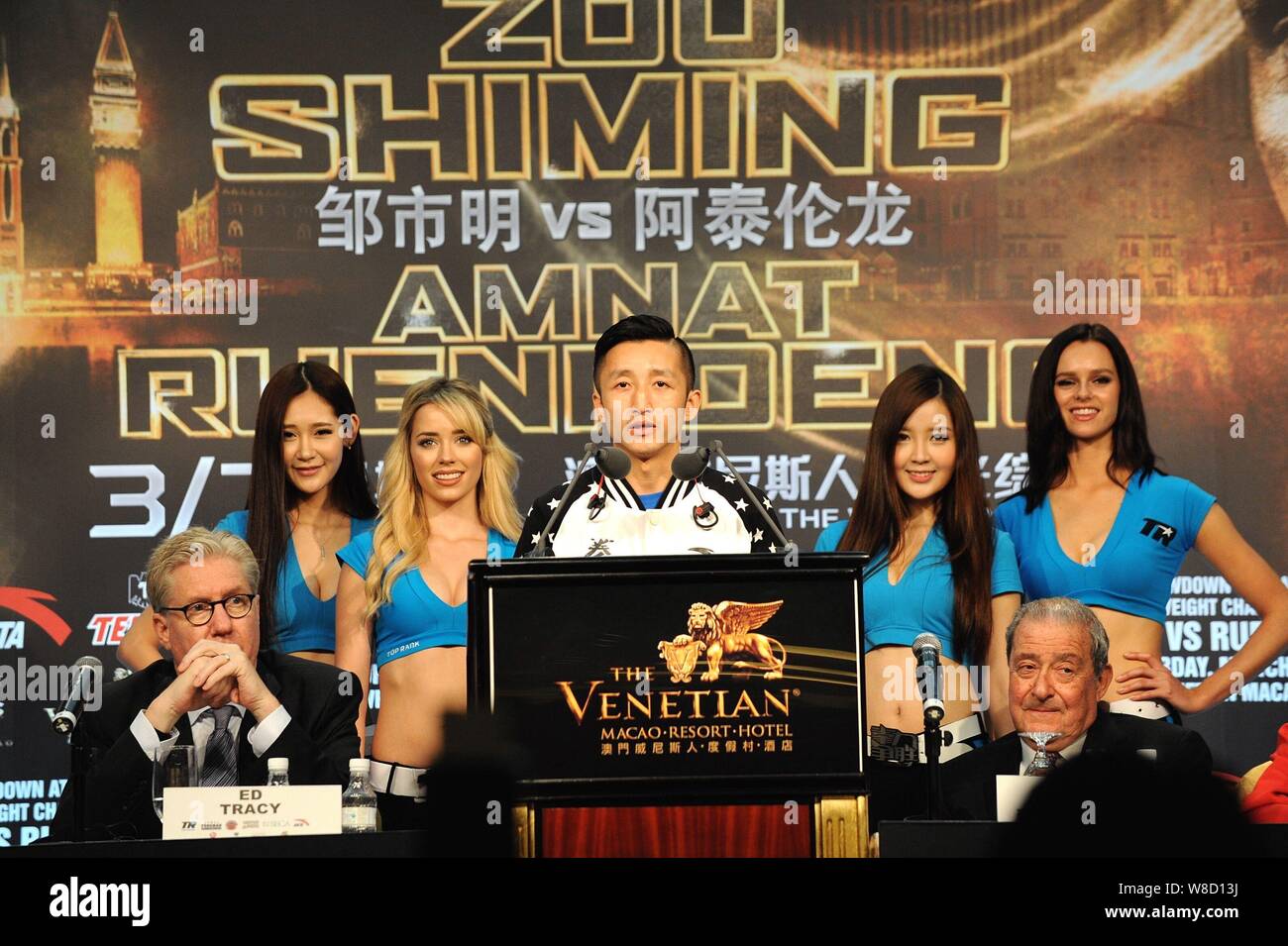 Olympic boxing gold medalist Zou Shiming of China, center, speaks ...