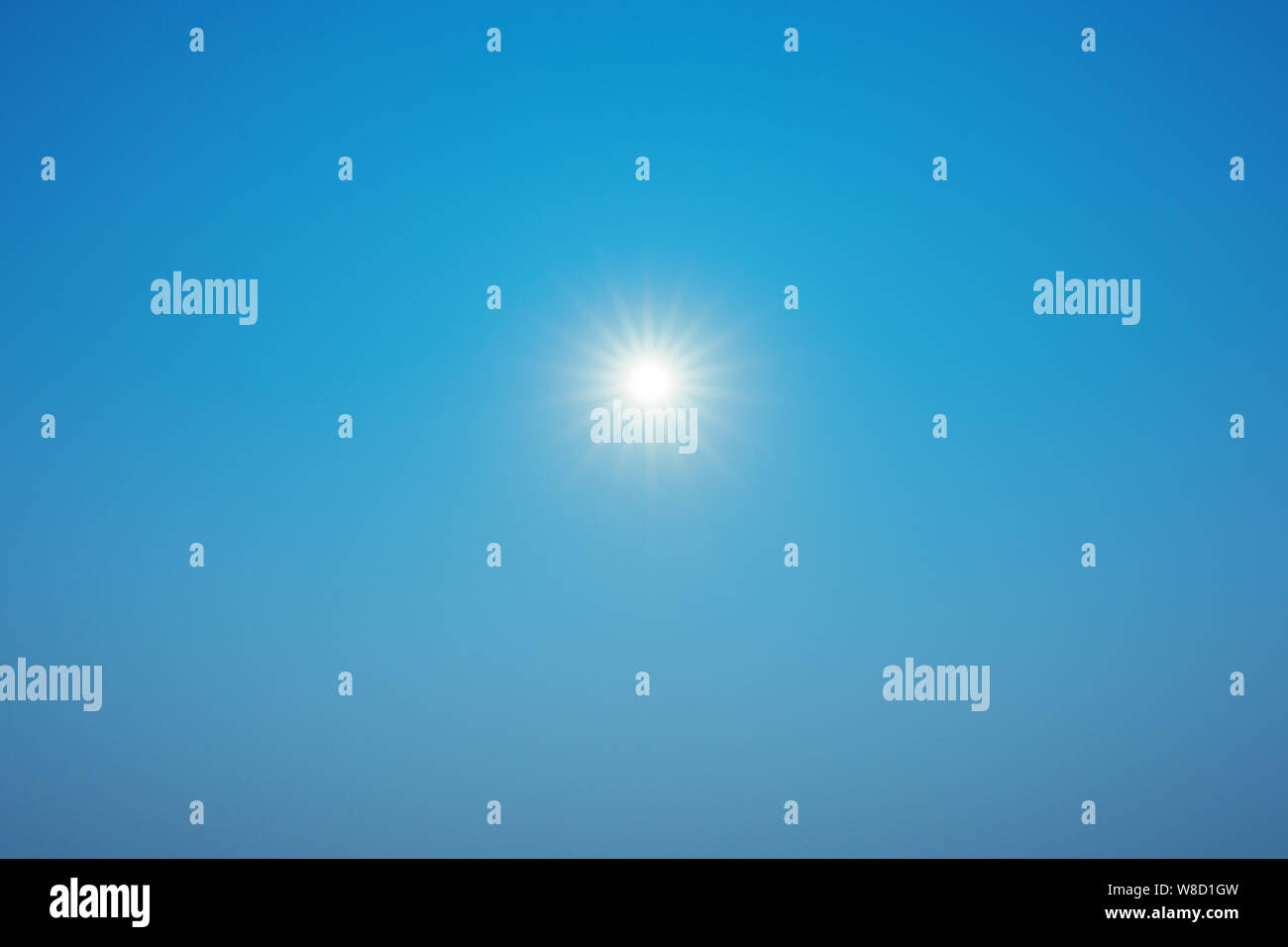 The sun shines bright in the daytime in summer. Blue sky and clouds ...