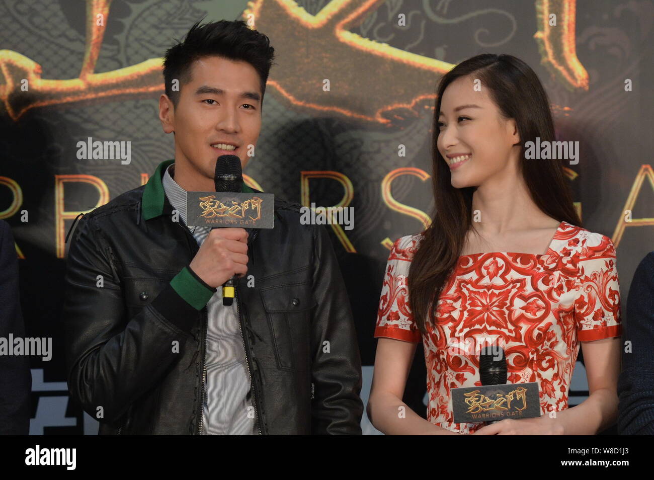 Chinese actress Ni Ni, right, smiles as Taiwanese actor Mark Zhao ...