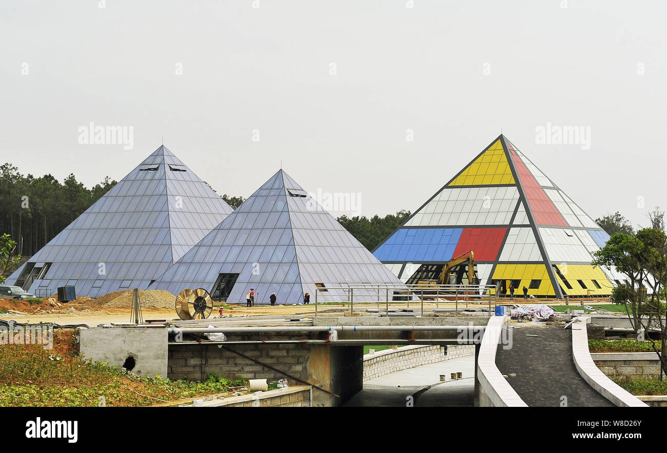 --FILE--View of three pyramid-shaped building under construction in ...