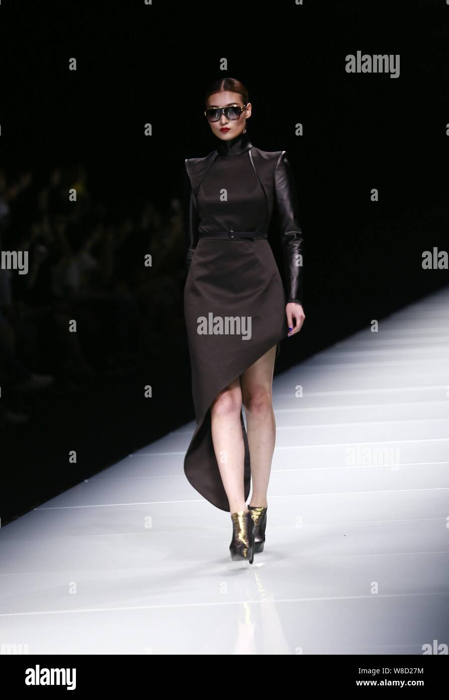 A model displays a new creation by Chinese fashion designer Mary Ma in ...