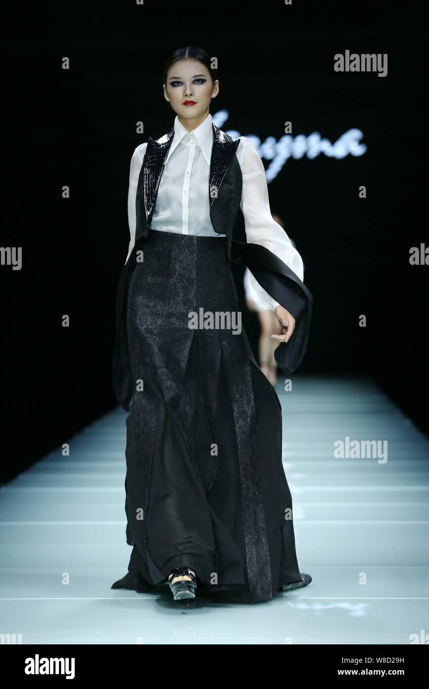 A model displays a new creation by Chinese fashion designer Mary Ma in ...