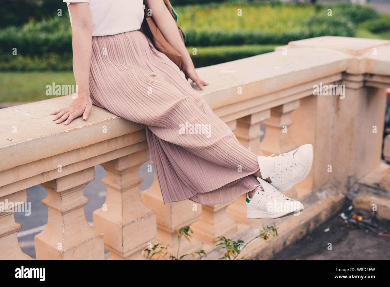 Girl looking over railing hi-res stock photography and images - Alamy