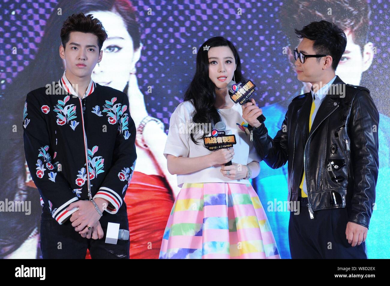 Chinese actress Fan Bingbing, center, speaks next to singer and actor ...