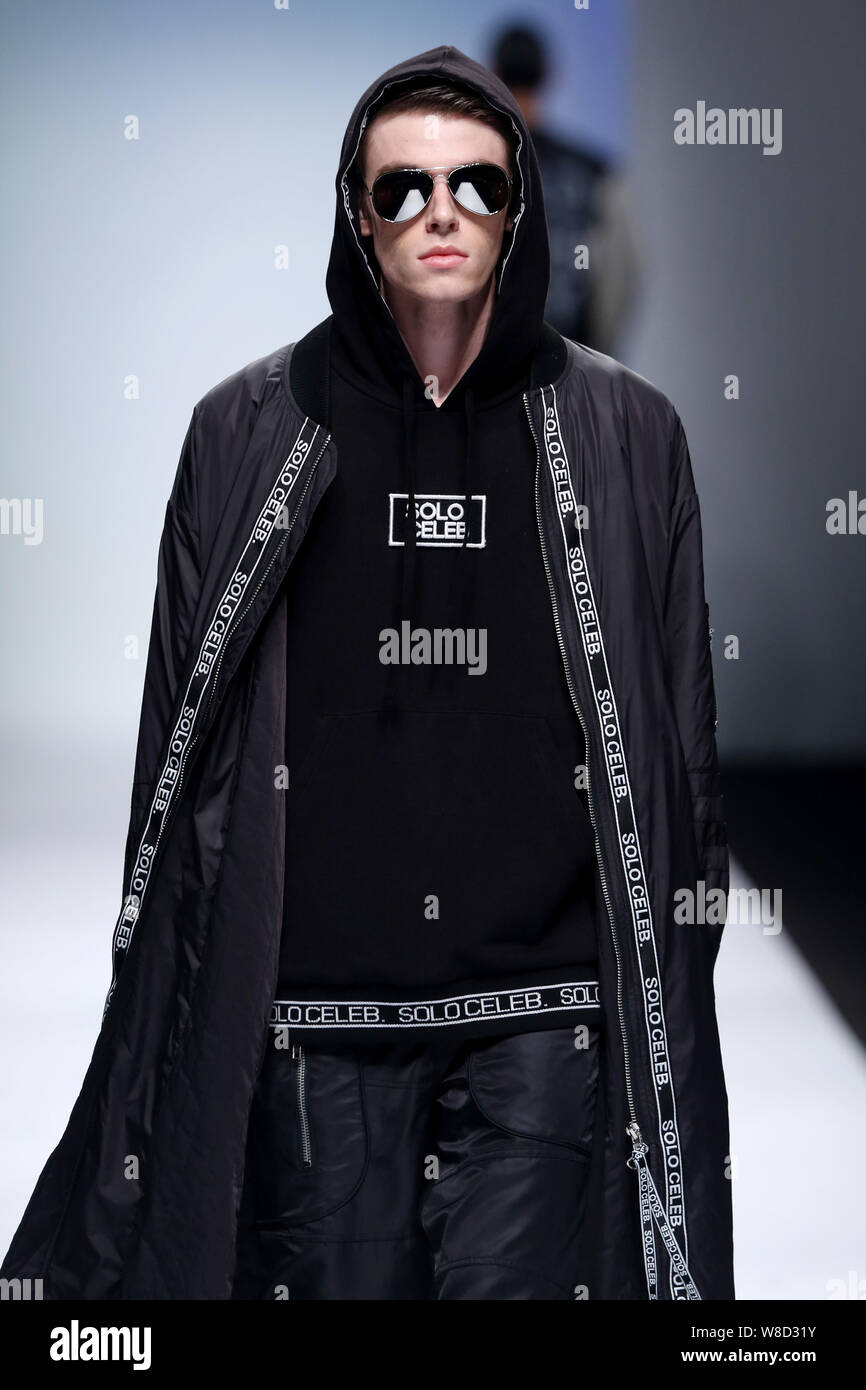 A model displays a new creation at Hong Kong singer and actor Leo Ku ...