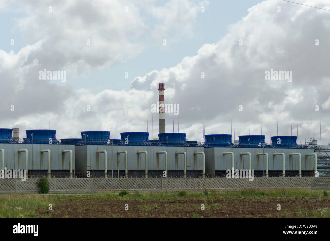 industrial factory and chimney, production Stock Photo - Alamy