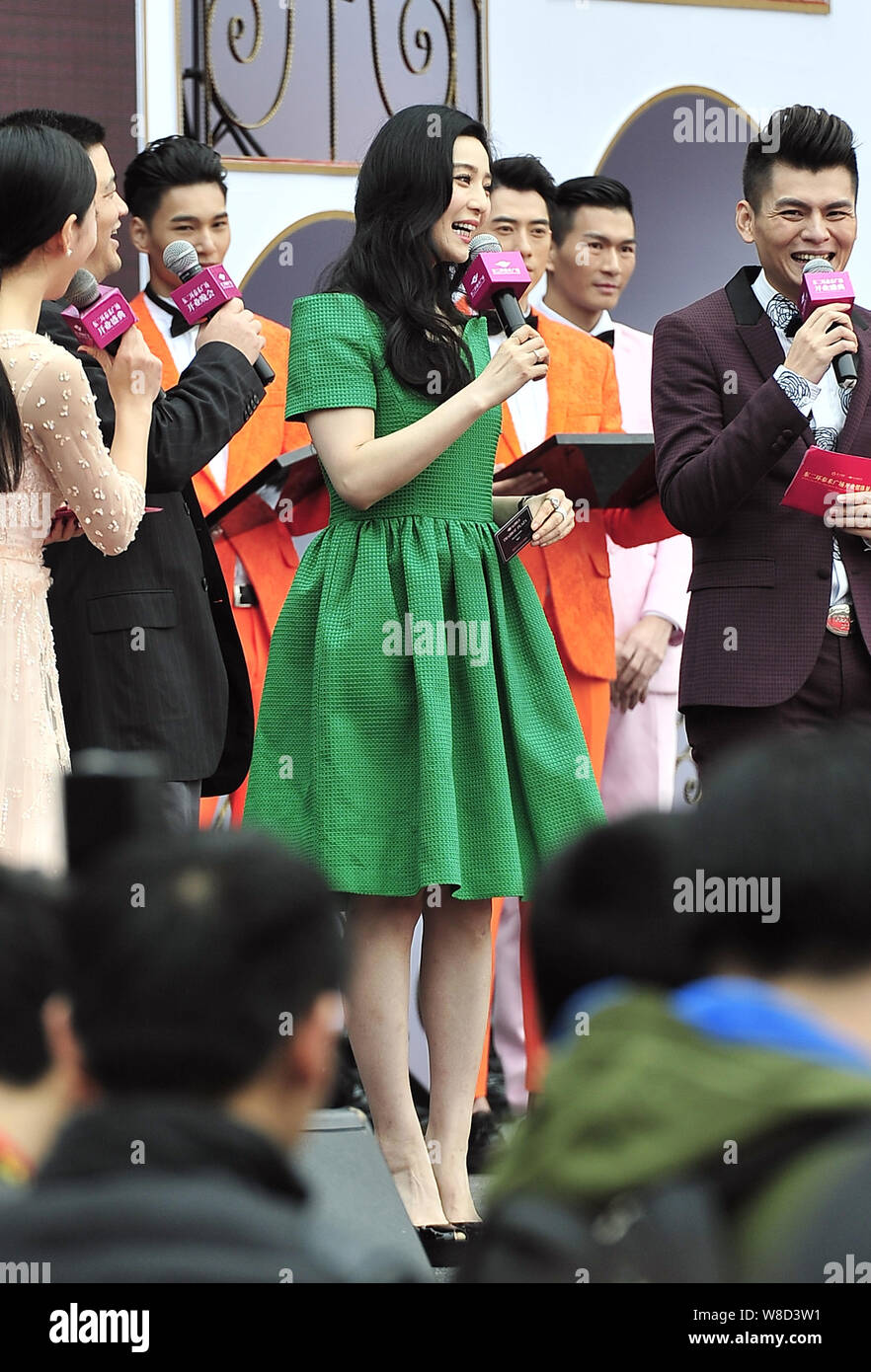 Chinese actress Fan Bingbing, center, smiles during the opening ...