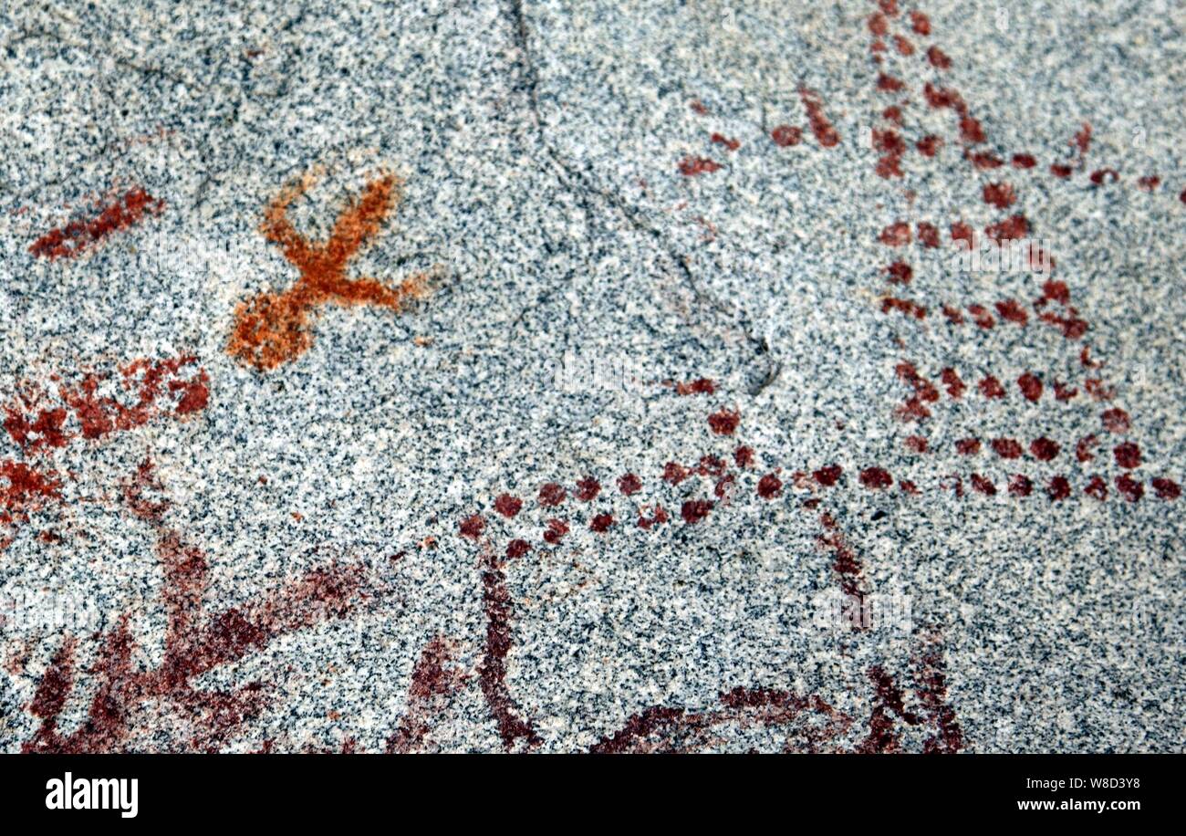 View of rock carvings discovered in Duogate cave in Habahe county ...