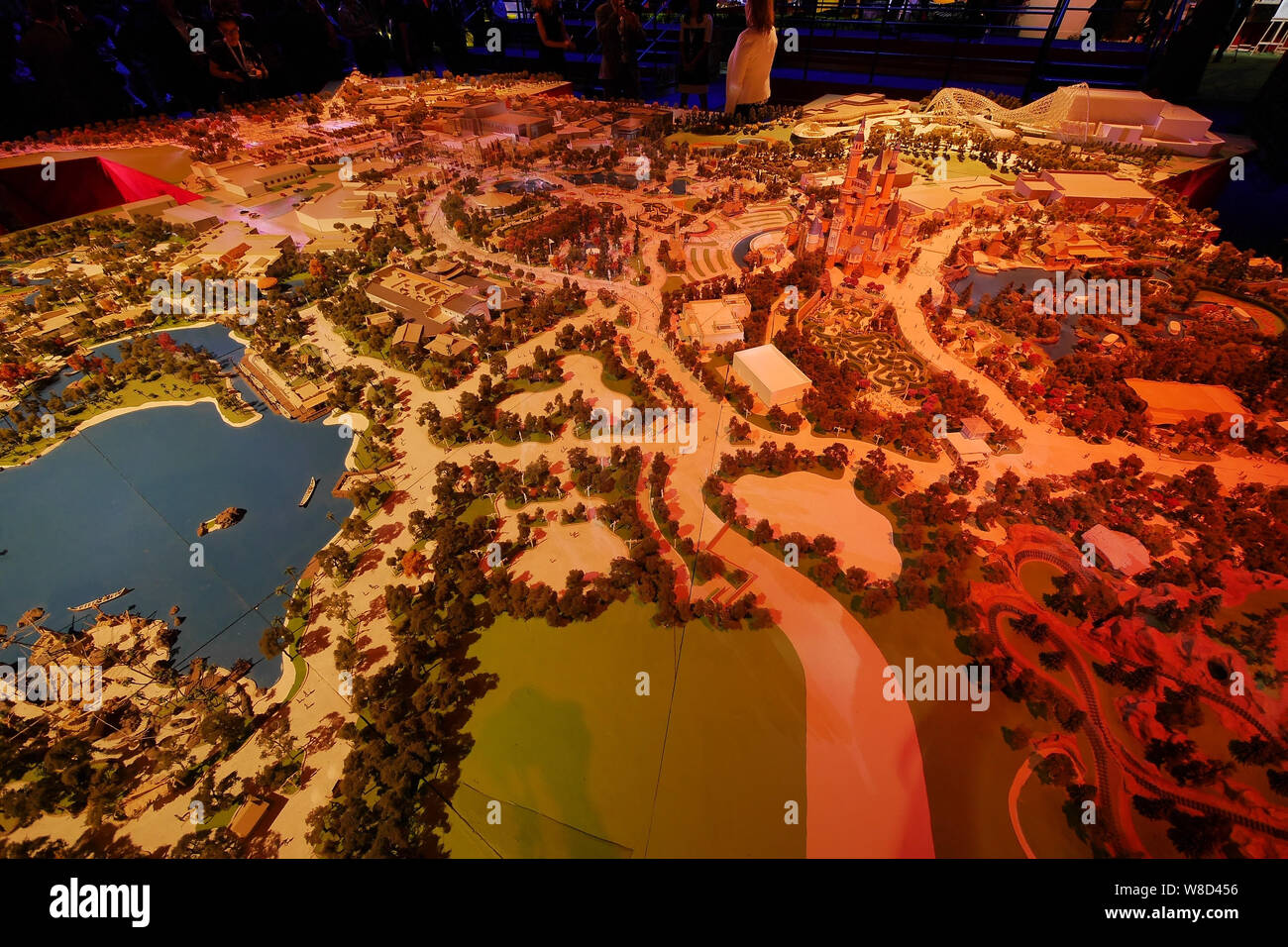 A scale model of the Shanghai Disney Resort is on display during its ...