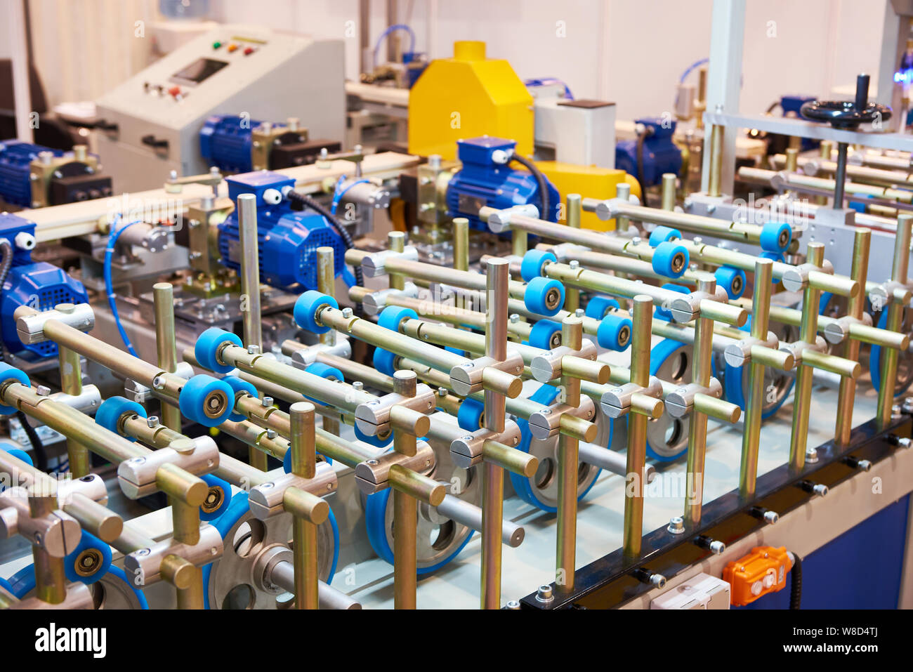 Wrapping line is designed for veneering with PVC films Stock Photo - Alamy