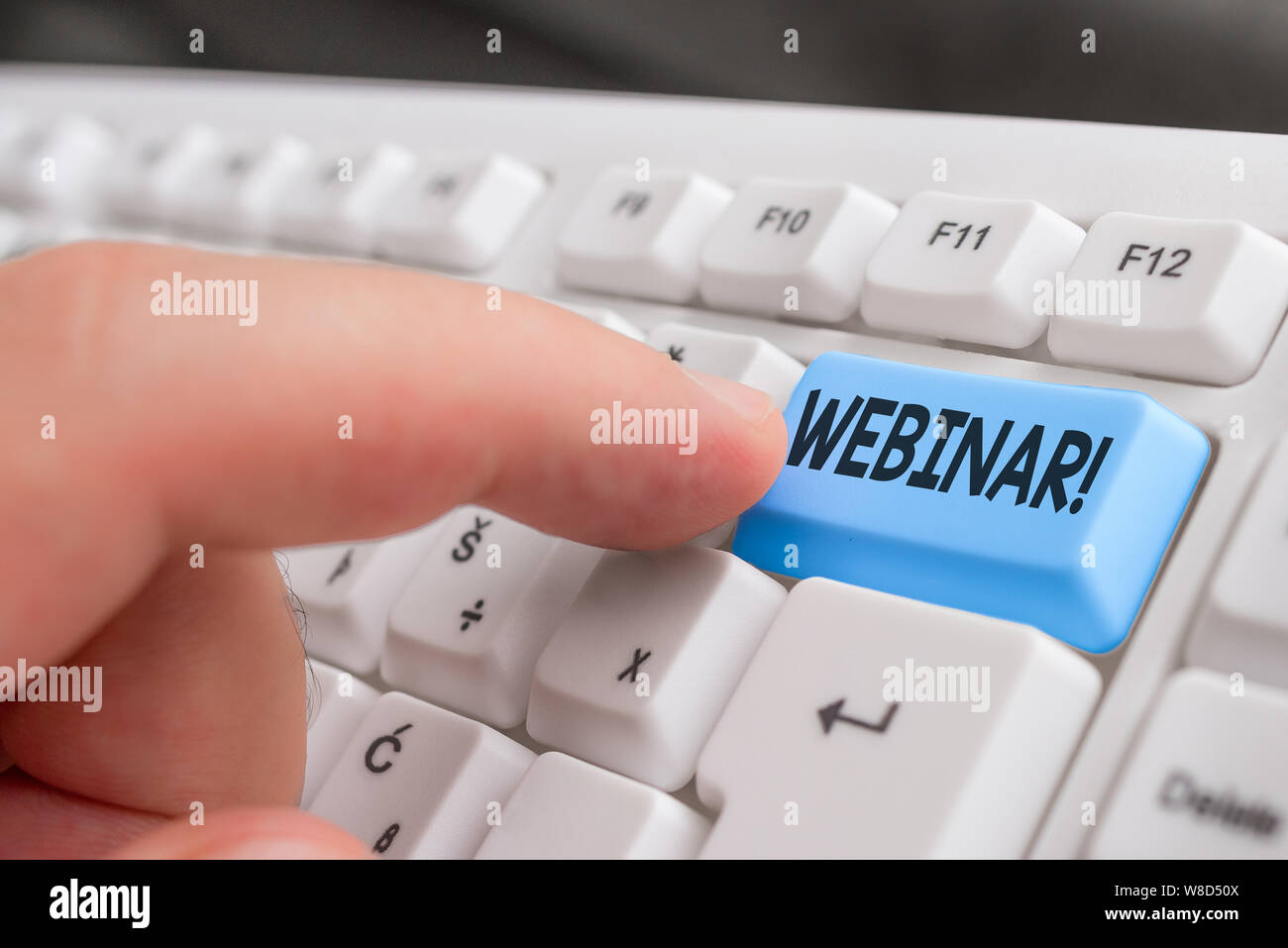 Writing note showing Webinar. Business concept for seminar or other ...