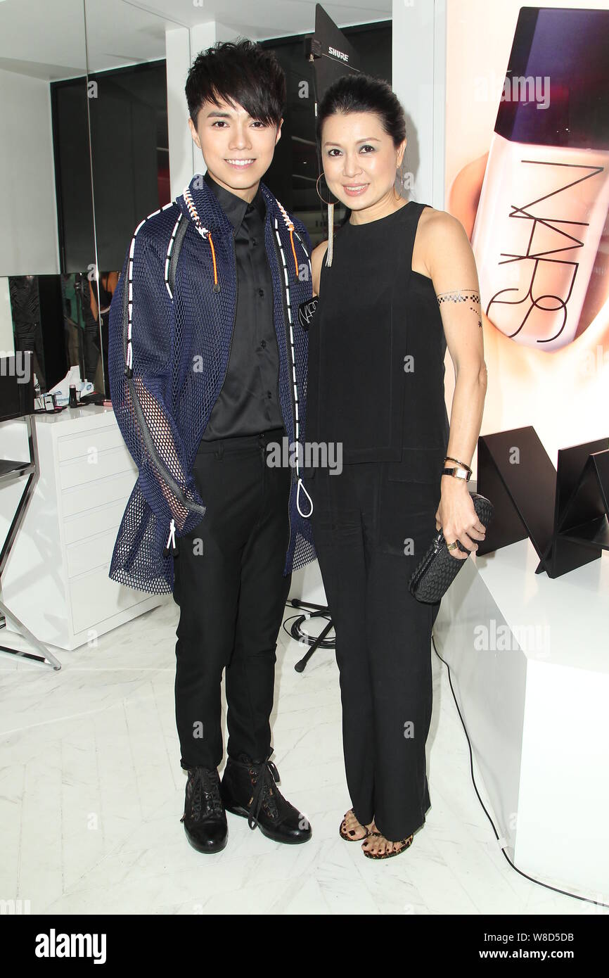 Hong Kong singer Hins Cheung, left, poses during the opening ceremony ...