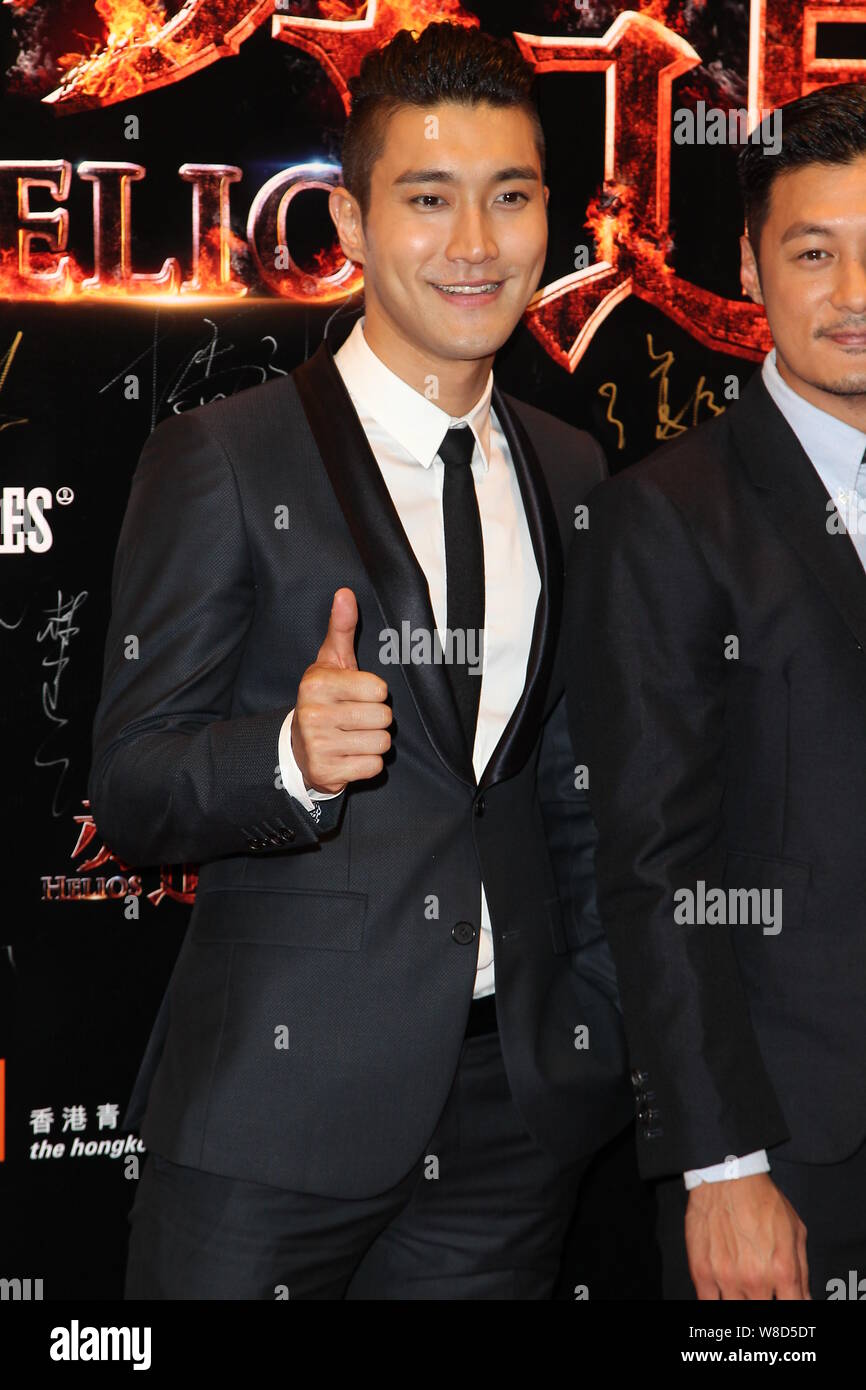 South Korean actor Choi Siwon, left, and Hong Kong actor Shawn Yue pose ...