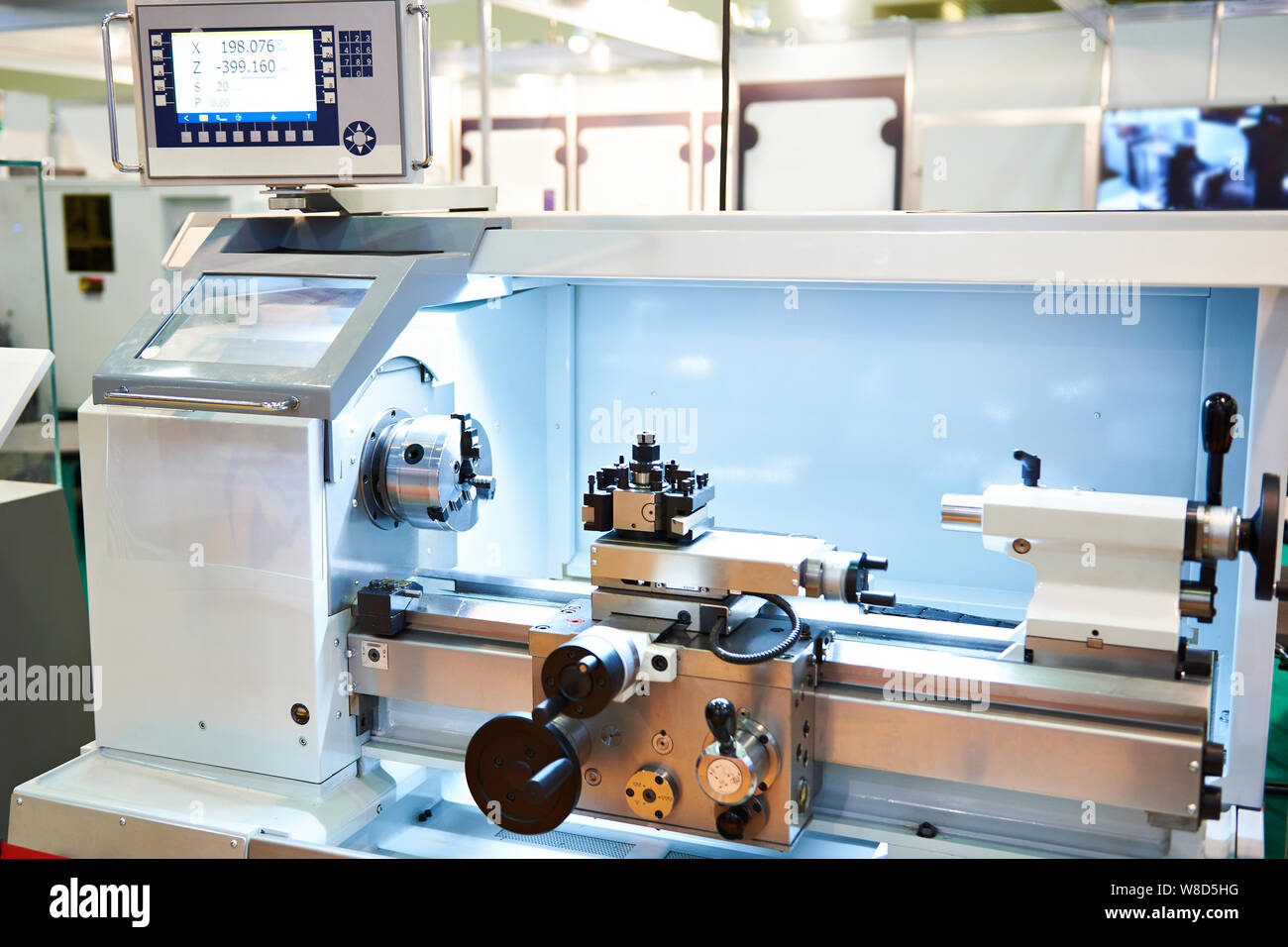 Modern lathe with monitor CNC Stock Photo - Alamy