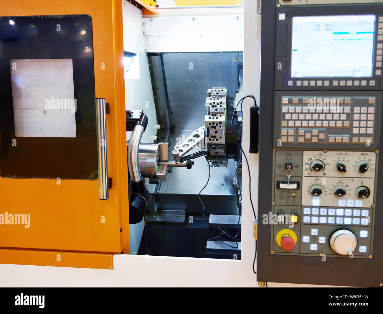 Compact modern lathe with CNC control panel Stock Photo - Alamy