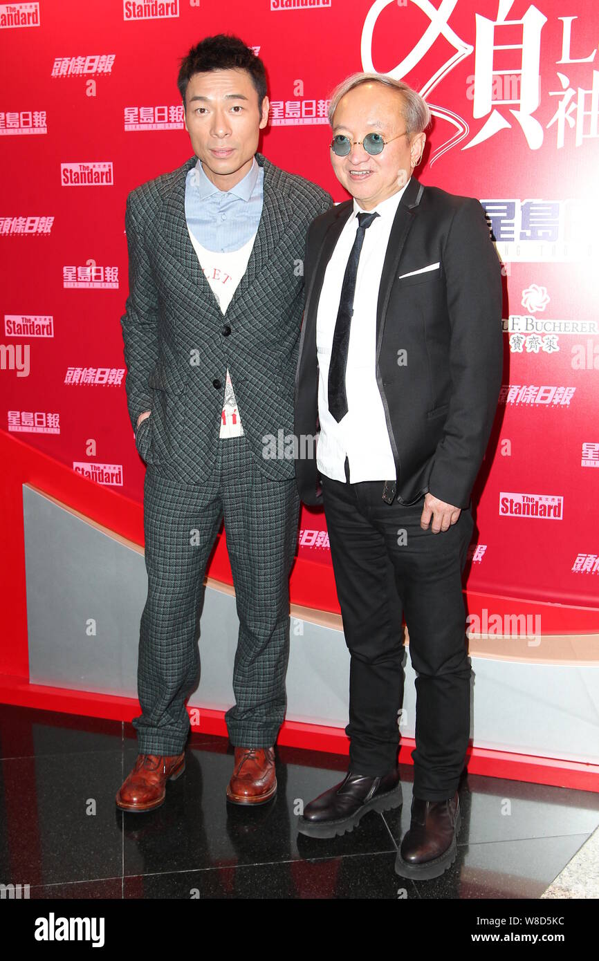 Hong Kong singer Andy Hui, left, poses with a guest during the 2014 ...