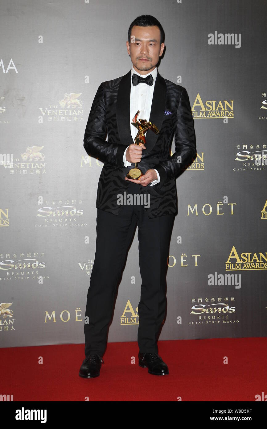 Chinese actor Liao Fan poses after winning the Best Actor award for his ...