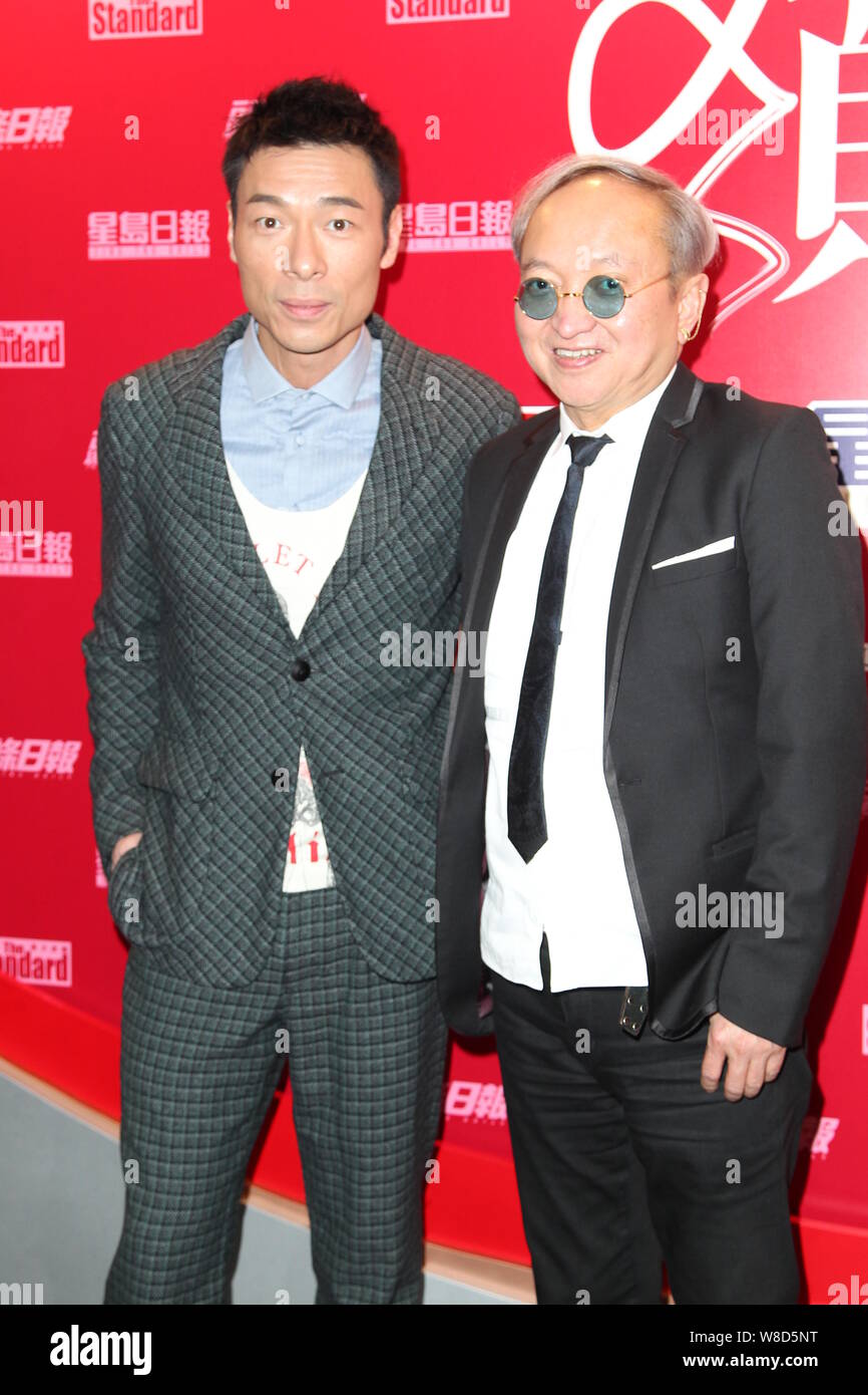 Hong Kong singer Andy Hui, left, poses with a guest during the 2014 ...
