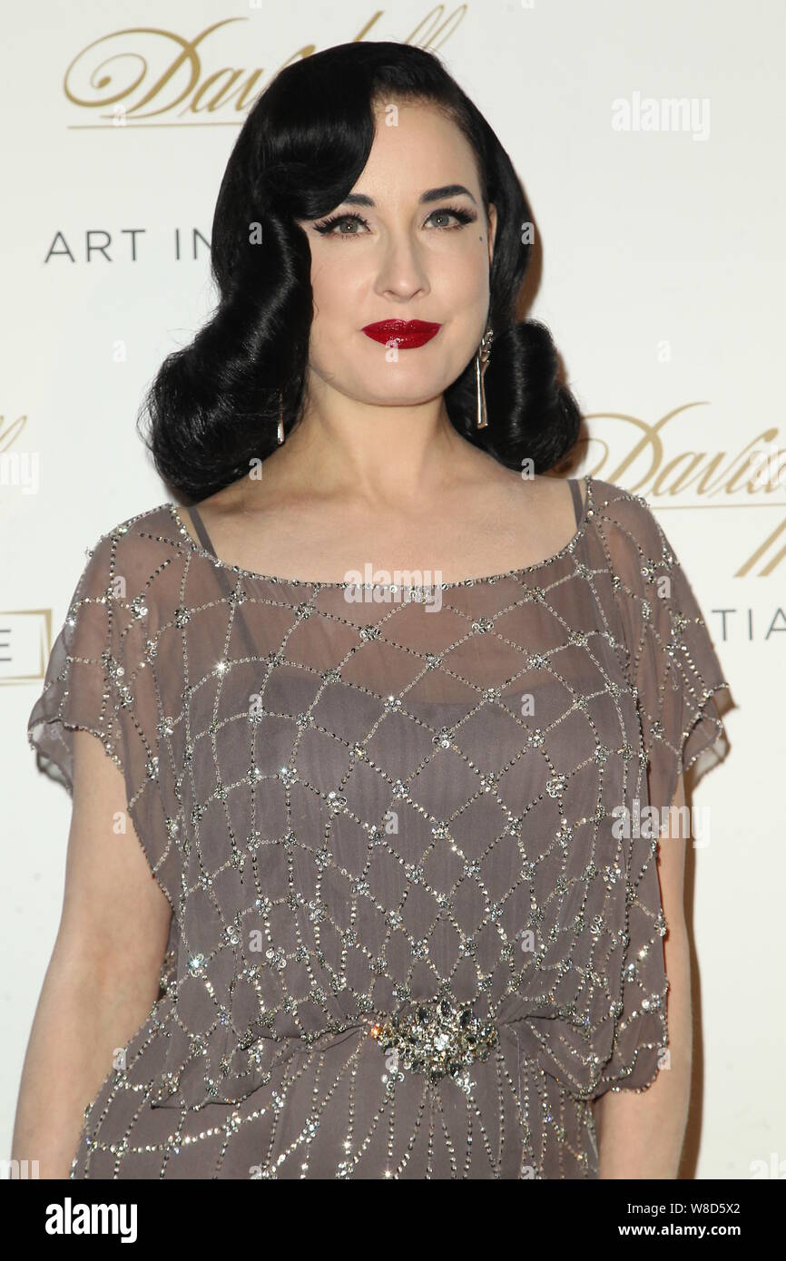 American burlesque dancer Dita Von Teese poses during a celebration ...