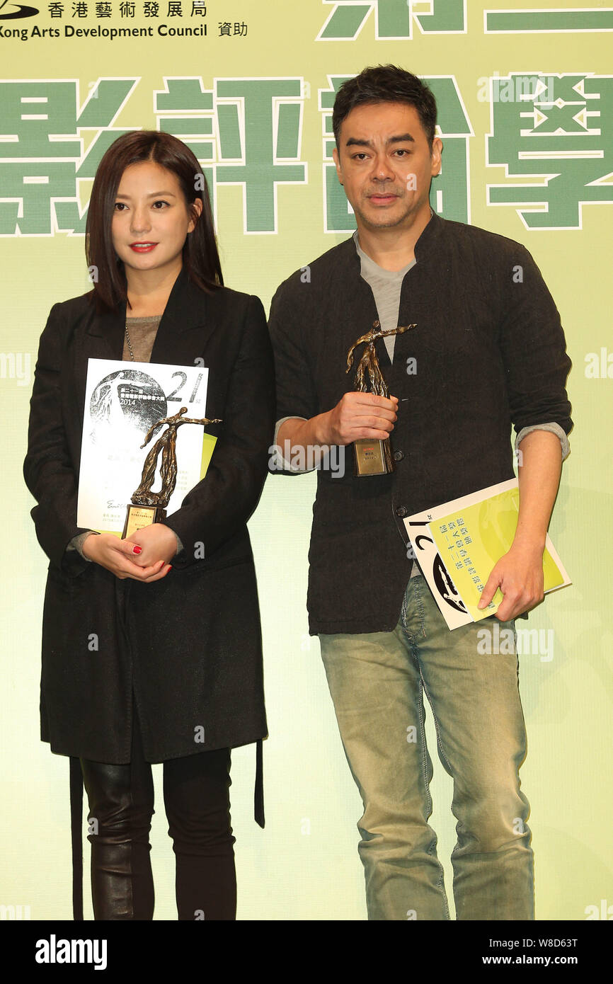 Chinese actress Zhao Wei, left, and Hong Kong actor Sean Lau hold their ...