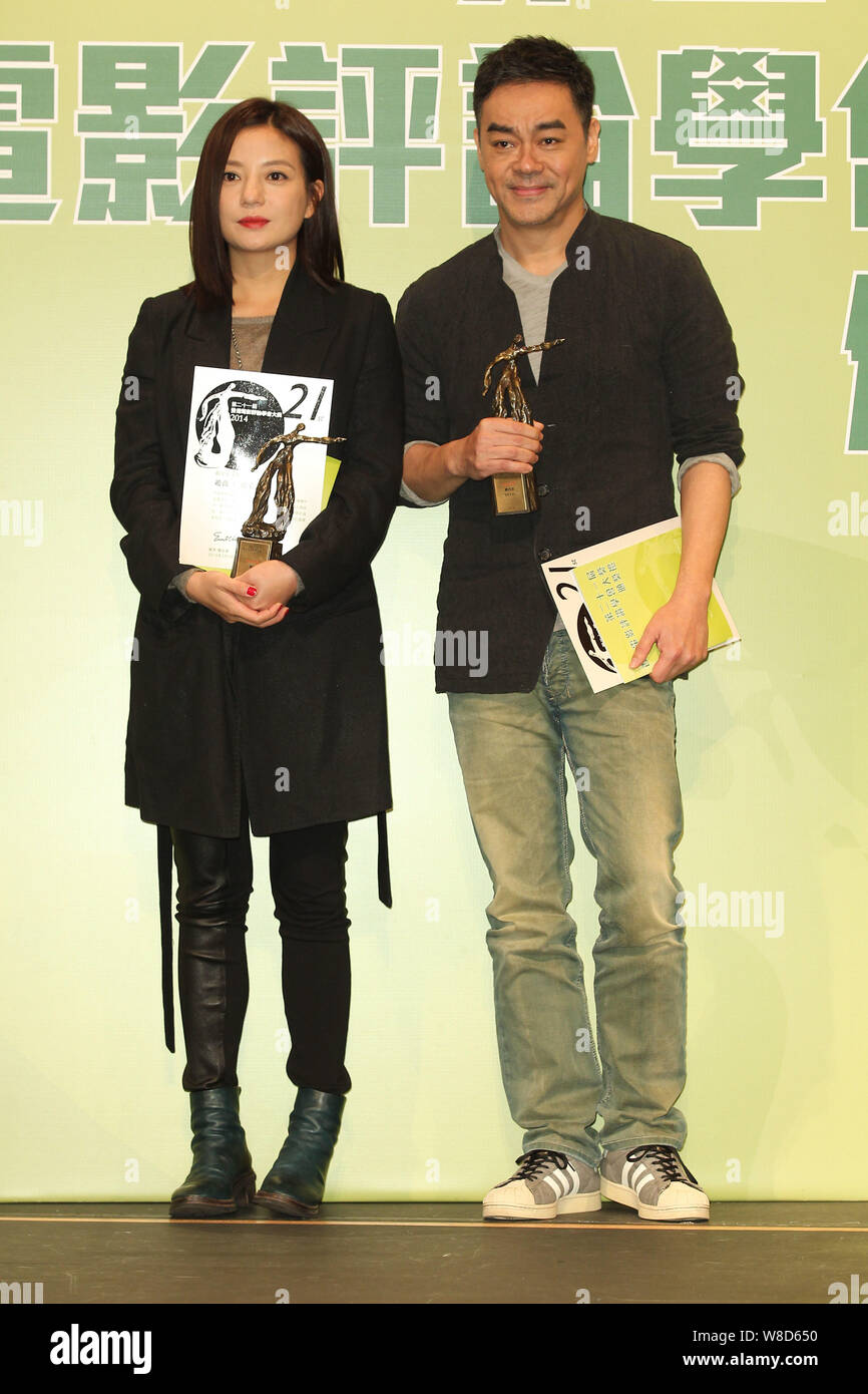 Chinese actress Zhao Wei, left, and Hong Kong actor Sean Lau hold their ...