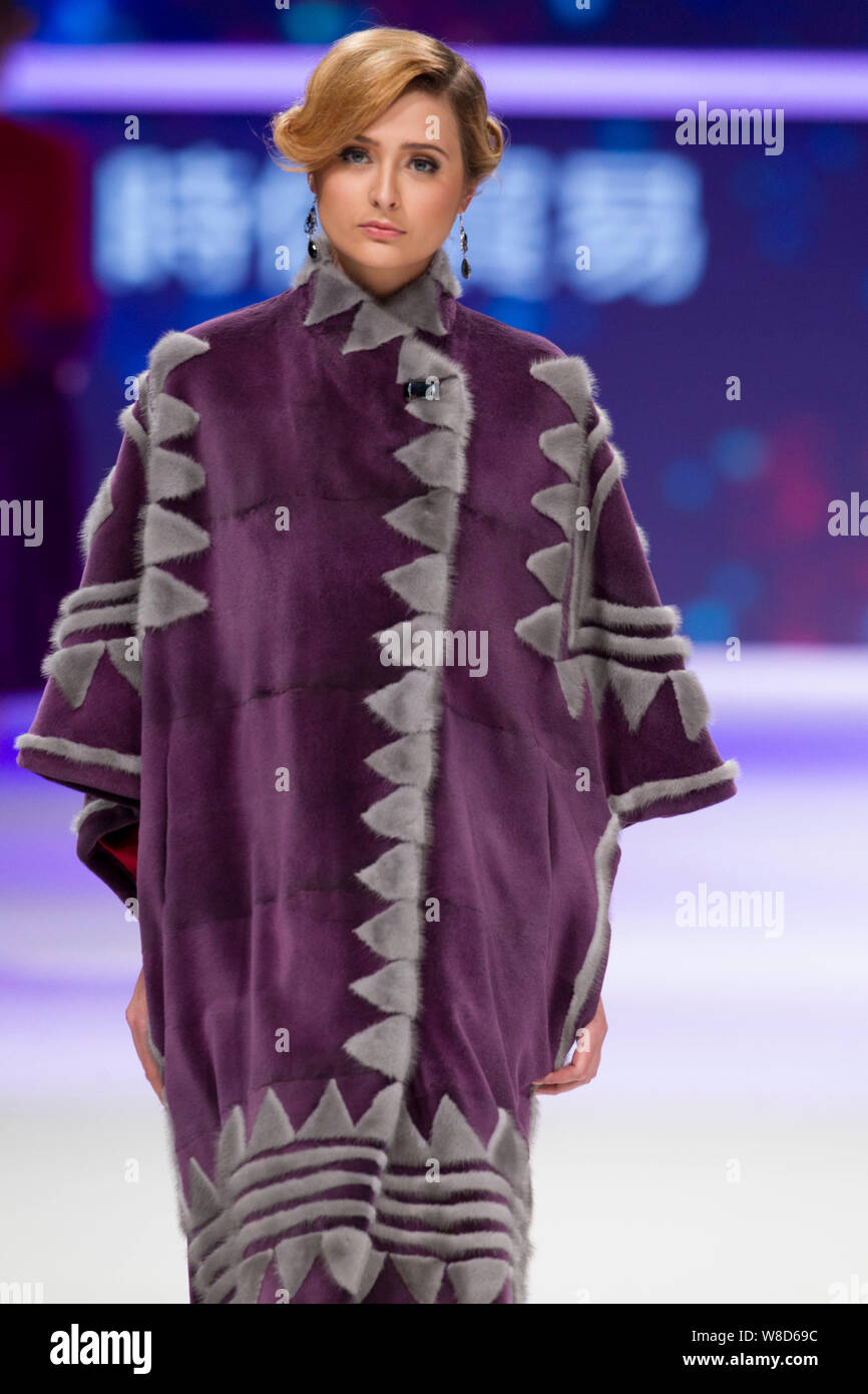 A model displays a creation made from animal fur at a fashion show ...