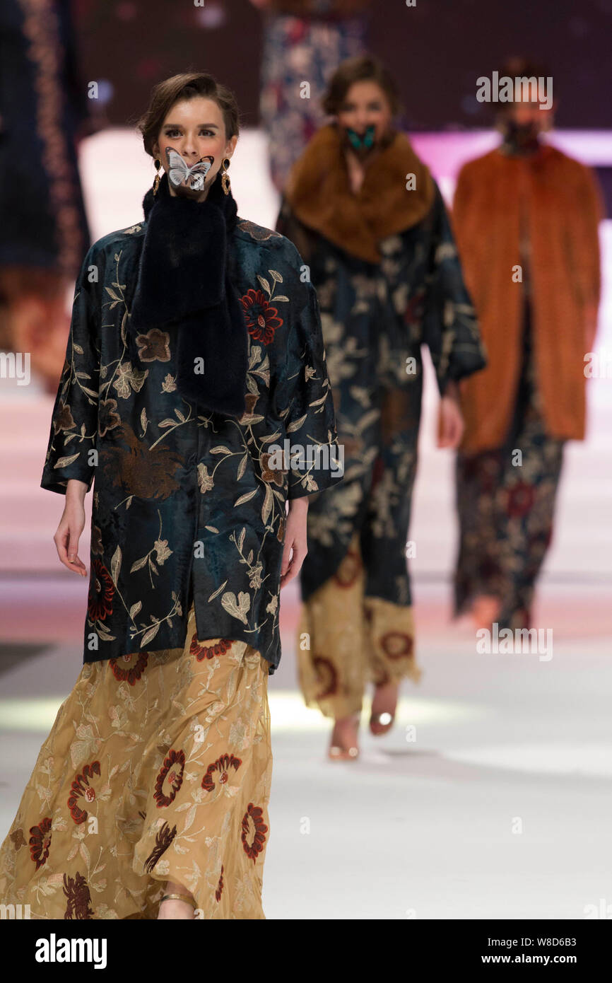 Models display creations made from animal fur at a fashion show during ...