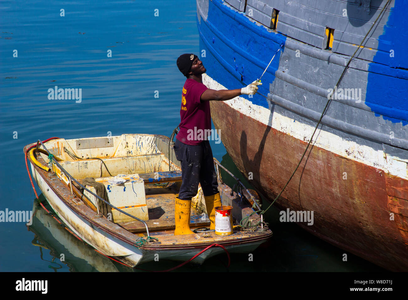 8 August 2019 An old working trawler undergoing routine painting and ...