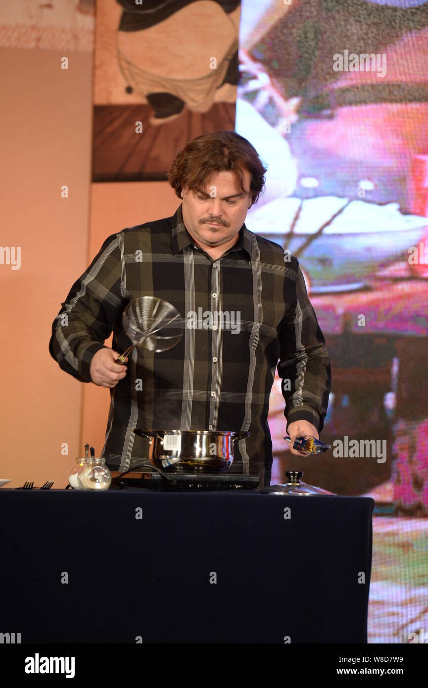 American actor Jack Black cooks noodles at a press conference for the ...