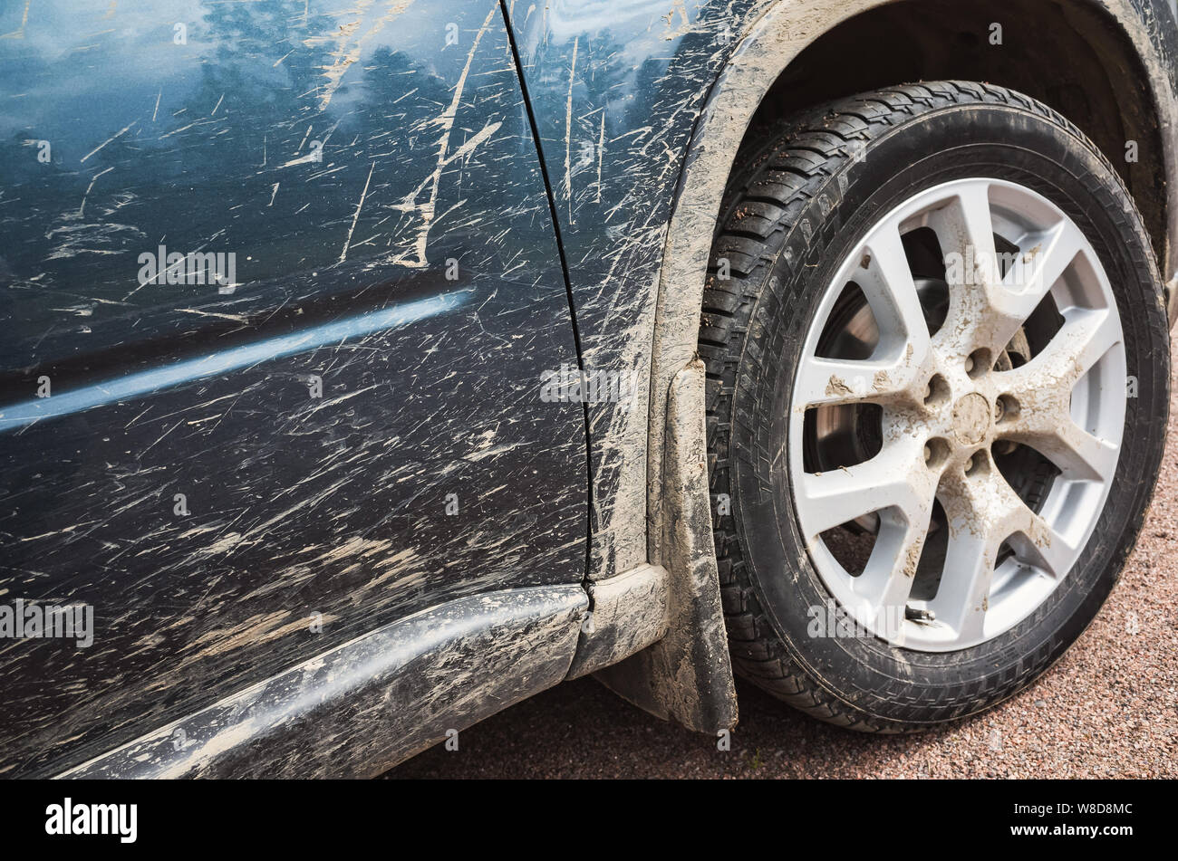 Dirty 4x4 SUV car wheel with light alloy disc close up photo, off-road ...