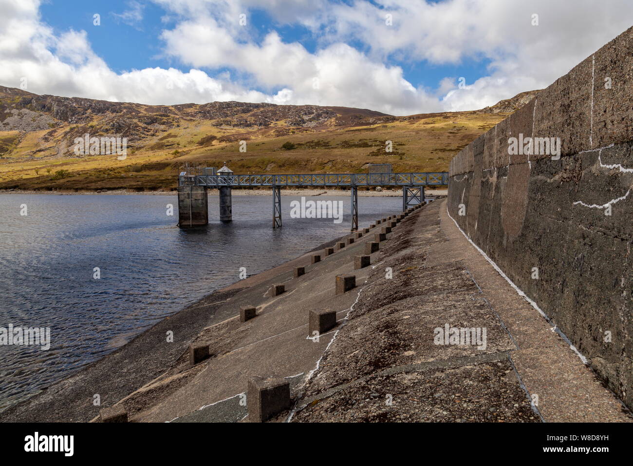 Looking across the dam wall of Llyn Cowlyd reservoir, which supplys ...
