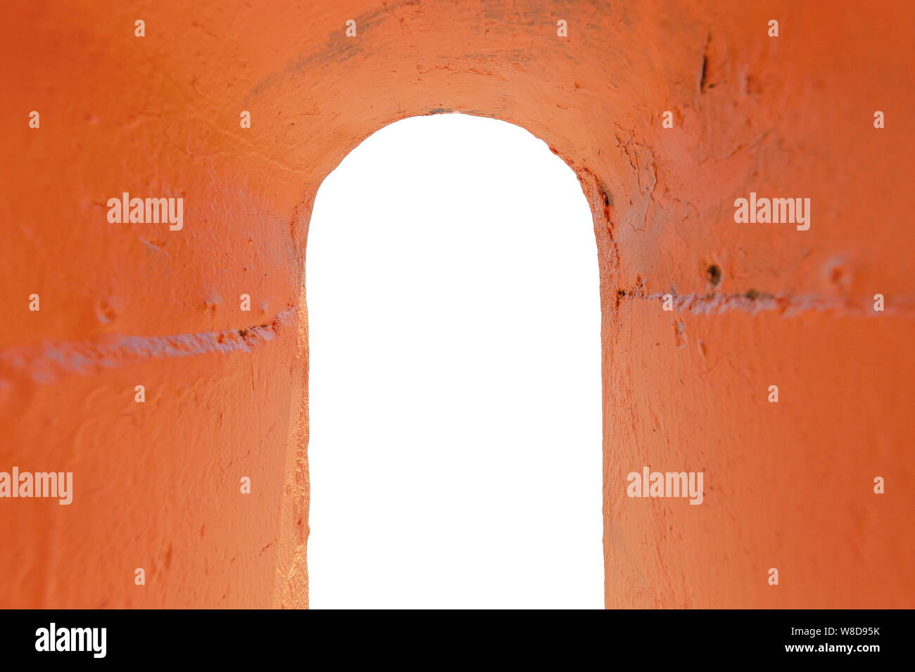 Orange wall tunnel Stock Photo - Alamy