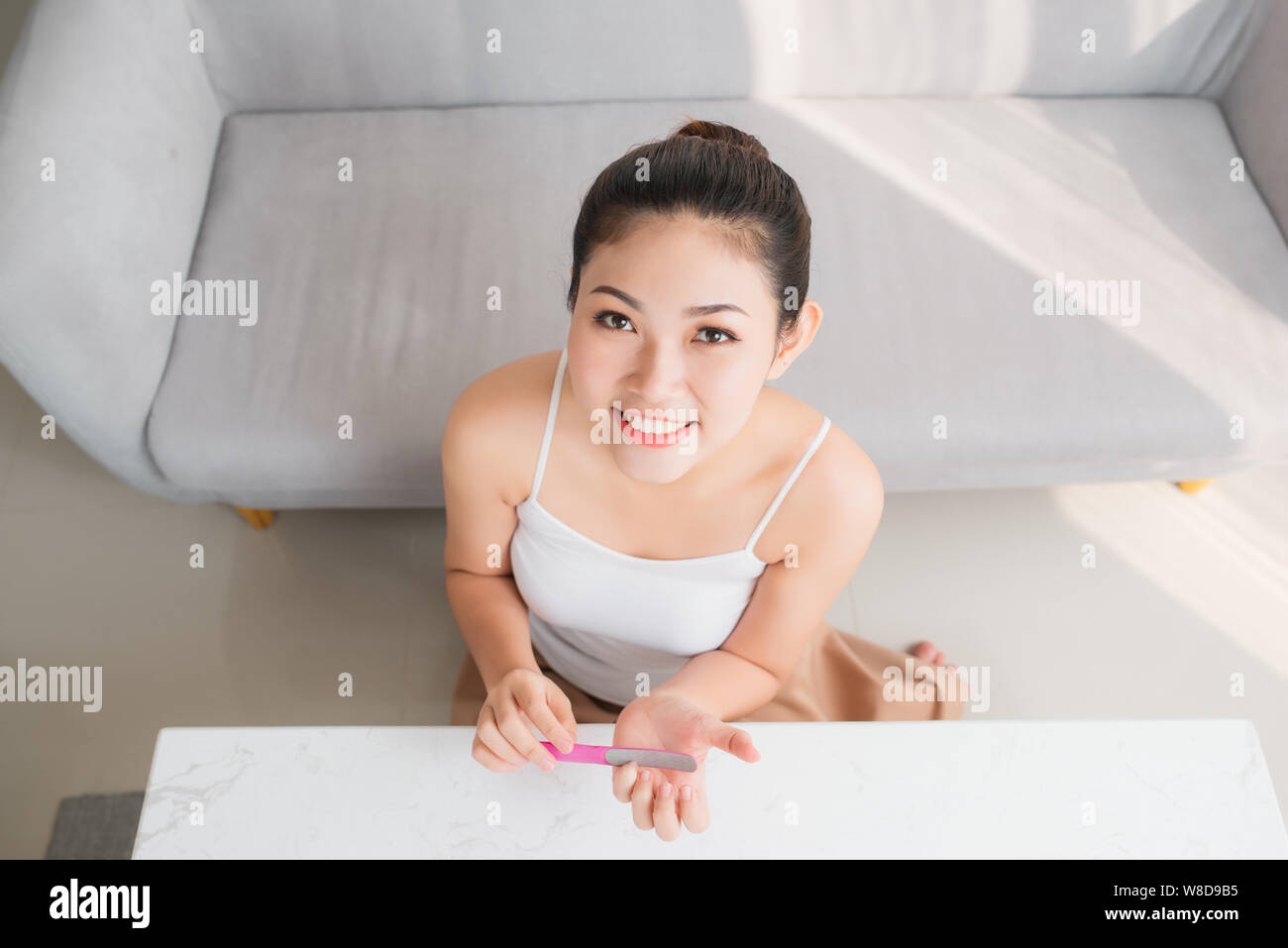 Attractive japanese woman sitting table hi-res stock photography and ...