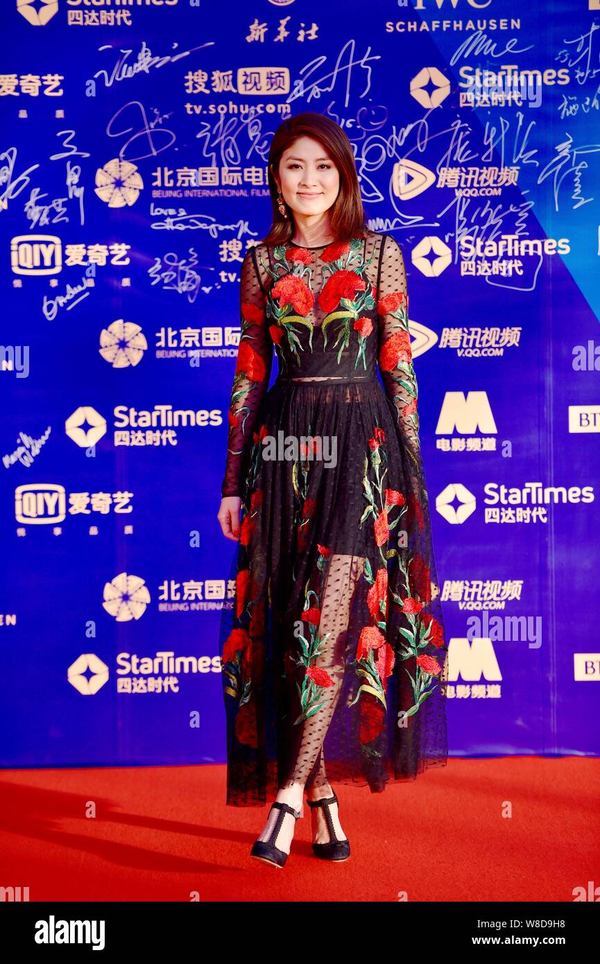 Hong Kong singer and actress Kelly Chen poses on the red carpet for the ...