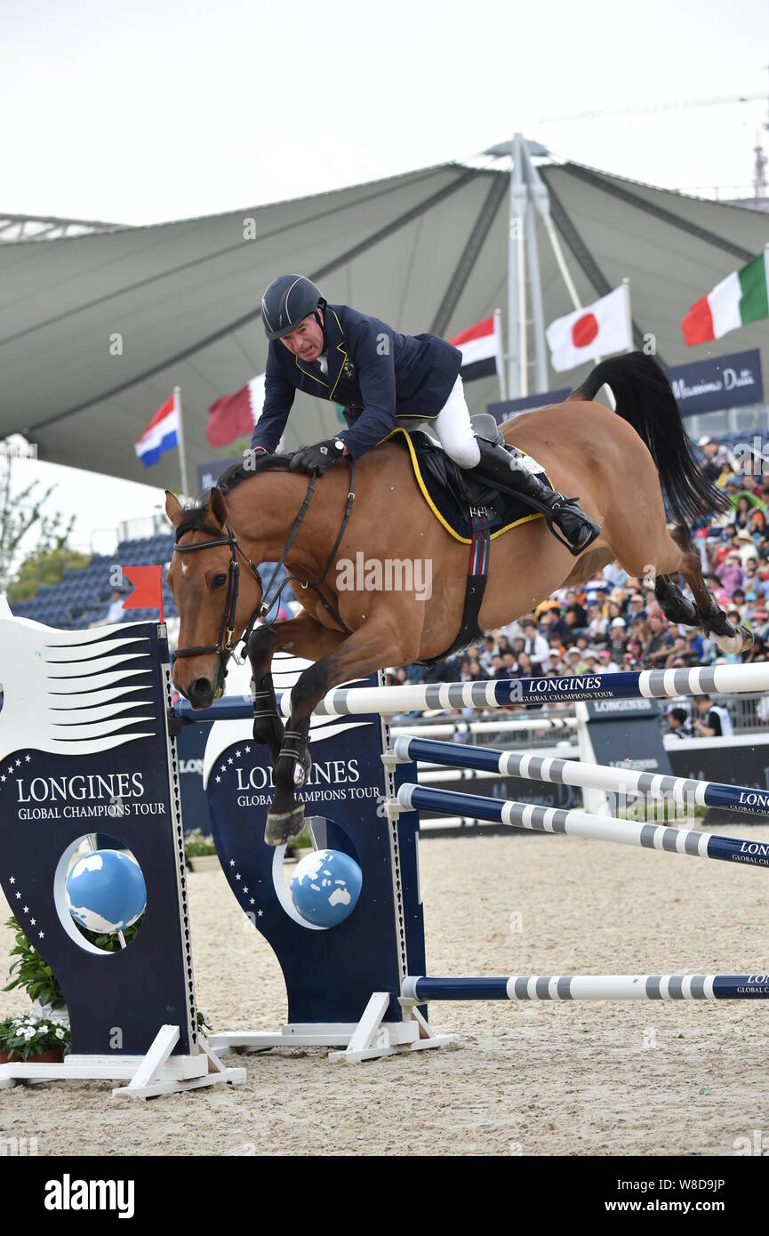 An equestrian rider competes in the Against the Clock during the ...